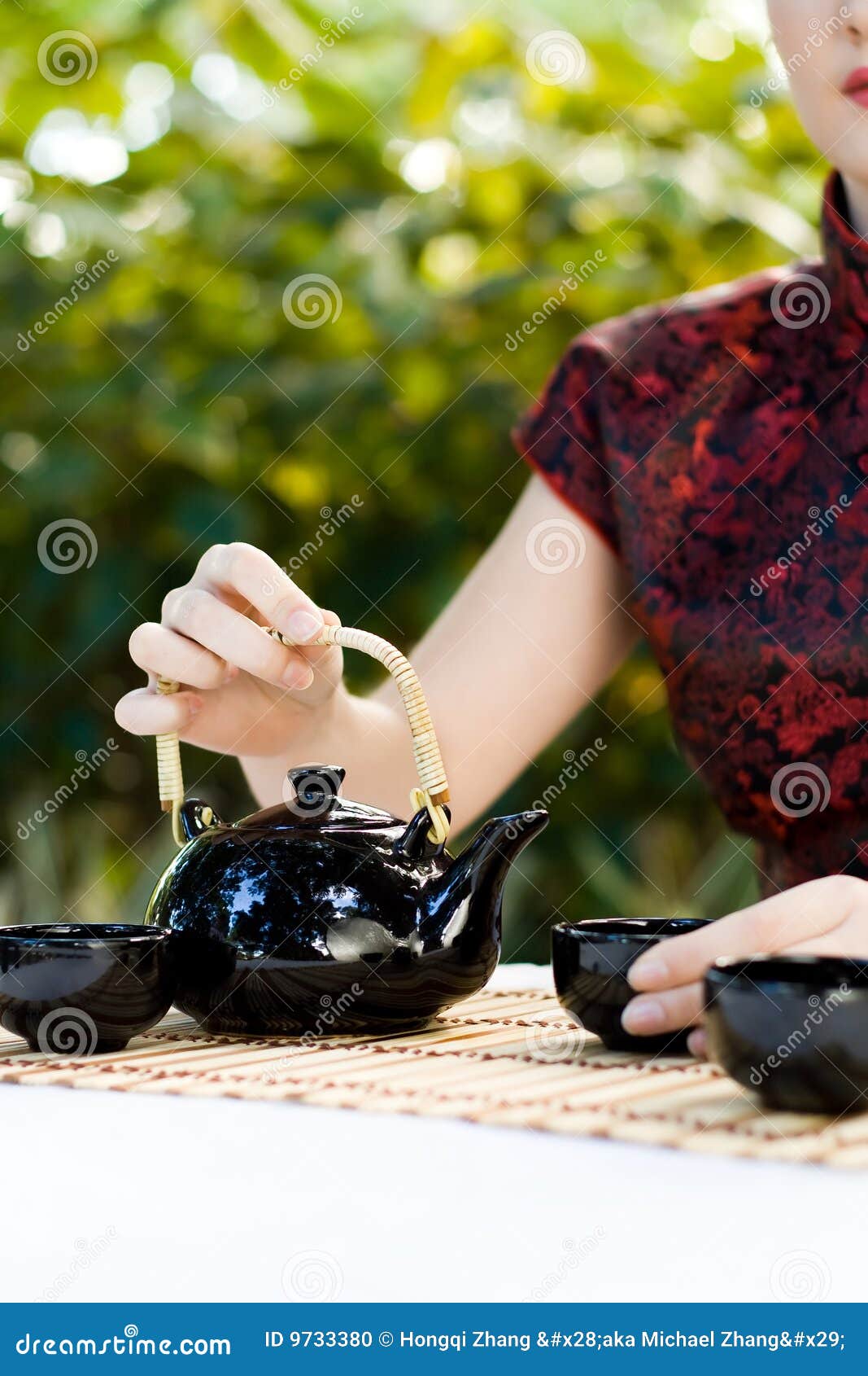Woman serving tea stock photo. Image of giving, beverage - 9733380