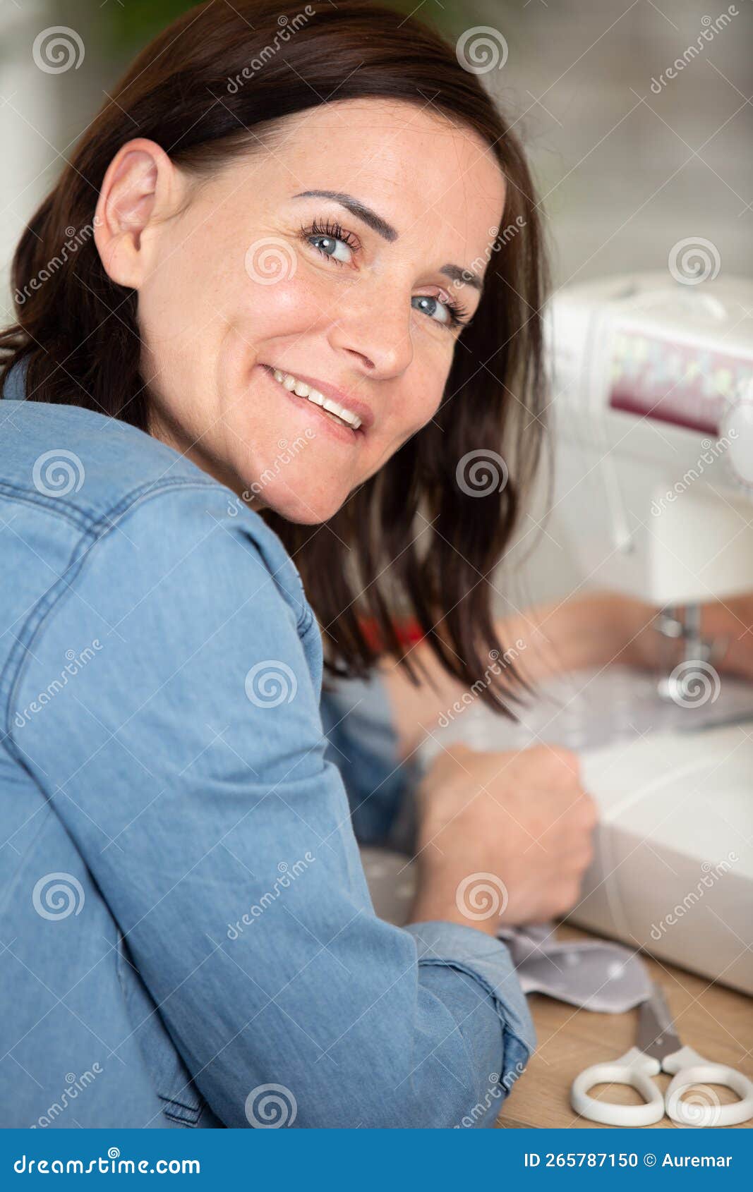 Woman Sewing with Sewing Machine Stock Photo - Image of brownhair ...