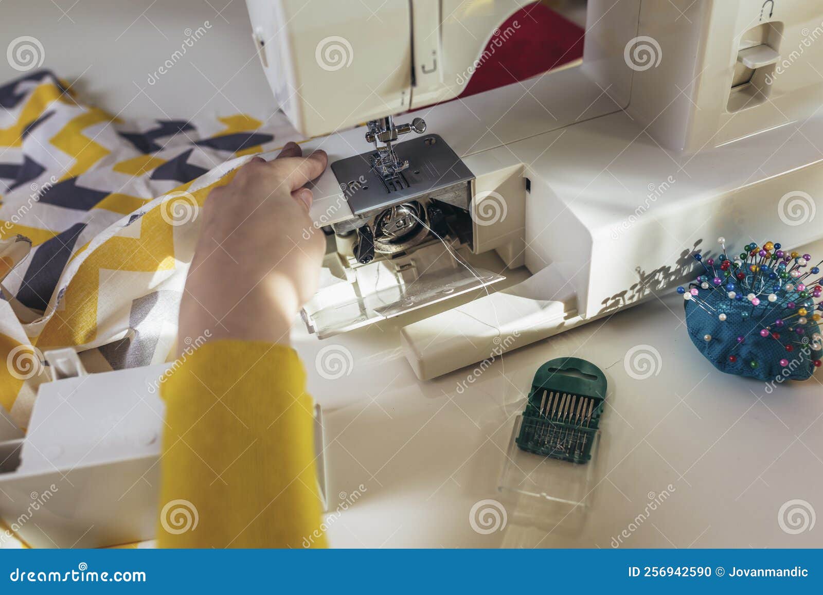 Woman Sewing on a Sewing Machine at Her Home Stock Photo - Image of ...