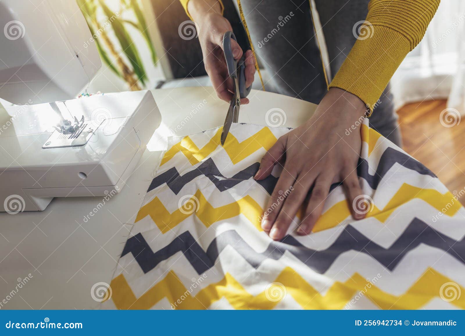 Woman Sewing on a Sewing Machine at Her Home Stock Photo - Image of ...