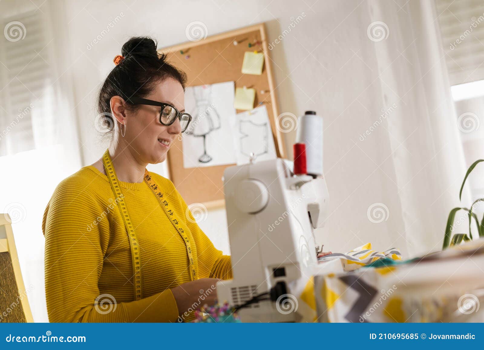 Woman Sewing on a Sewing Machine at Her Home Stock Image - Image of ...