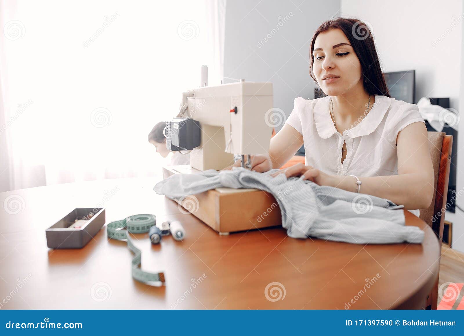 Woman Sewing on a Sewing Machine Stock Photo - Image of designer ...