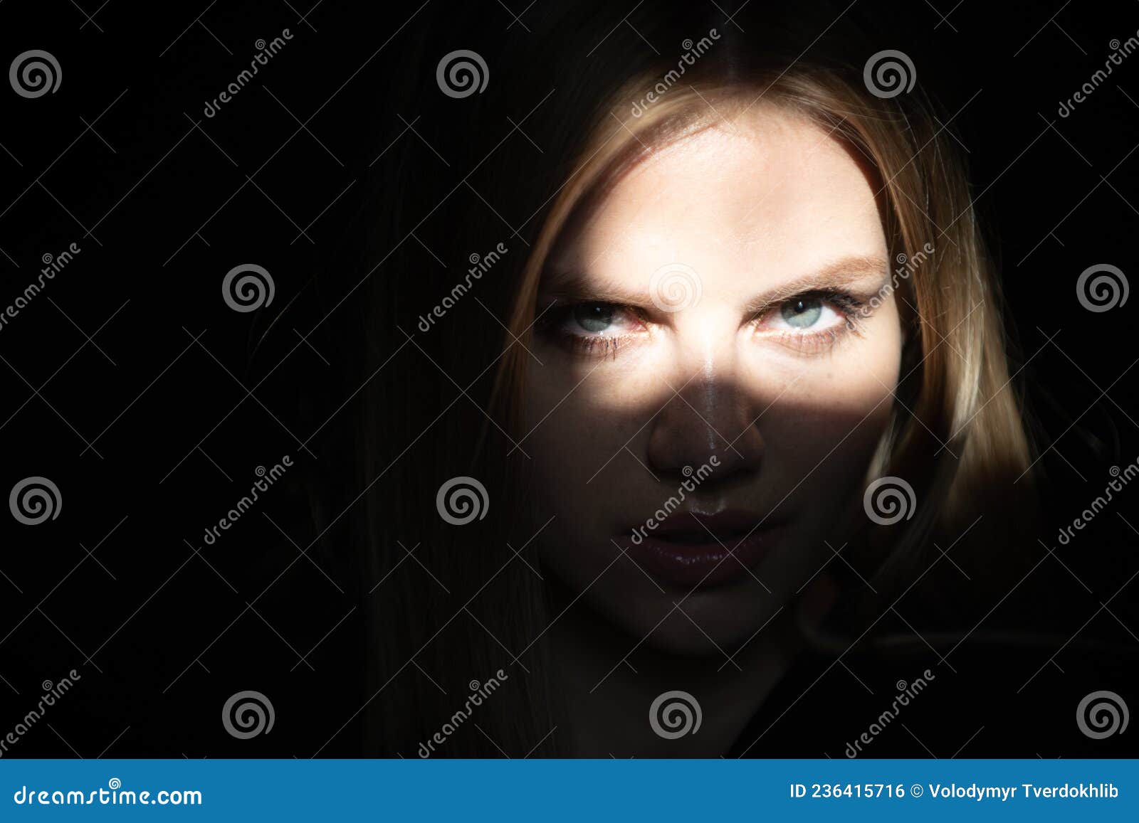 Woman in Shadow. Female Serious Model with Shadows on Face Looking ...