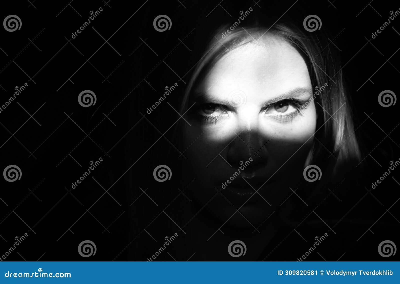 Woman in Shadow. Female Serious Model with Shadows on Face Looking ...