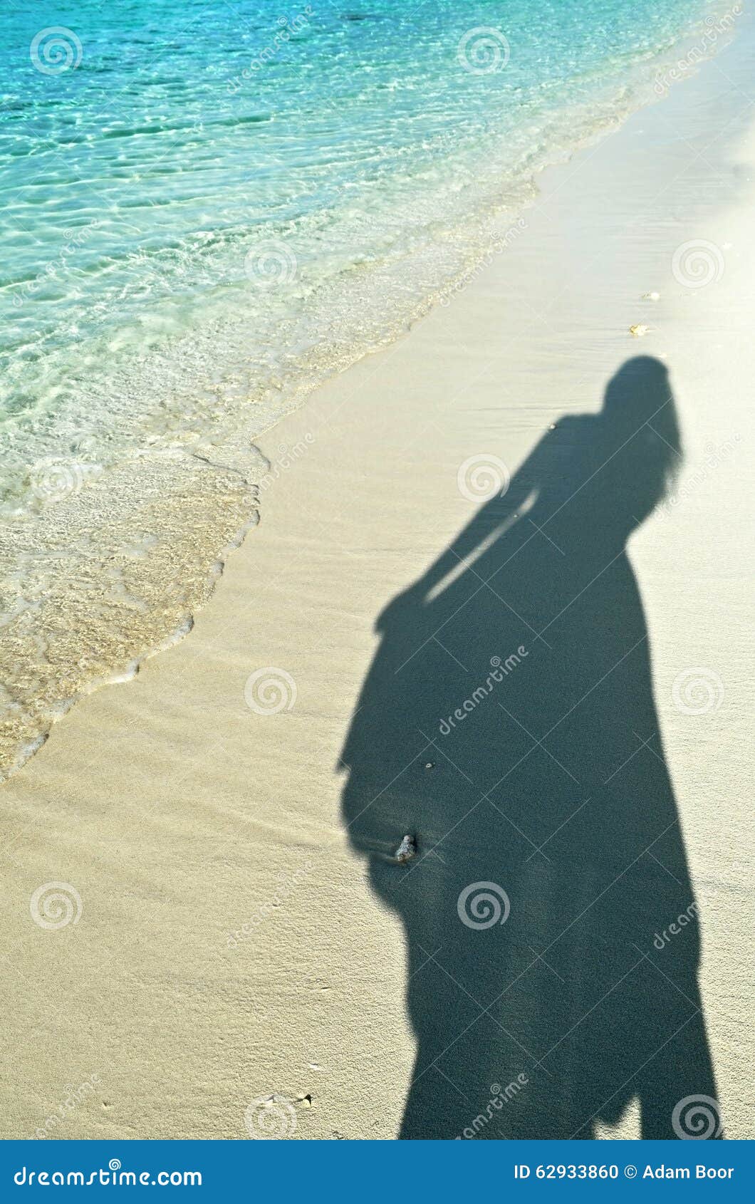 Woman shadow on the sand stock photo. Image of skirt - 62933860