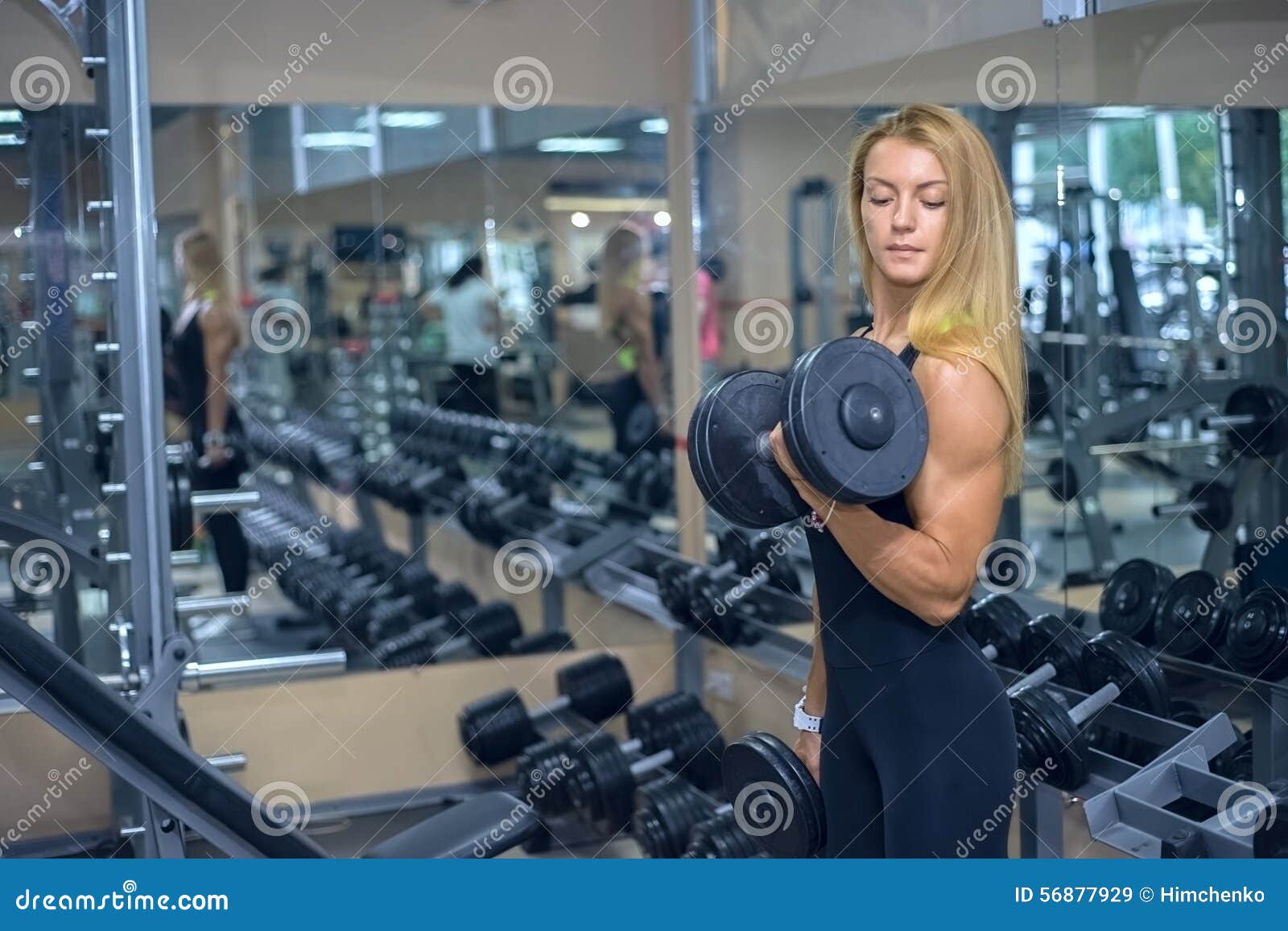 Woman Shakes Her Biceps at Gym Stock Image - Image of expressing ...