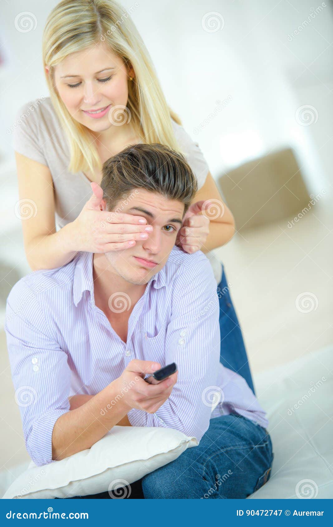 Woman Shielding Man`s Eyes from Television Stock Image - Image of ...