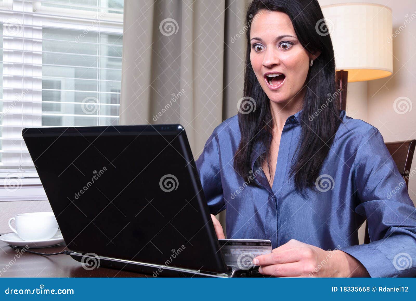 Woman shocked by computer stock photo. Image of modern - 18335668