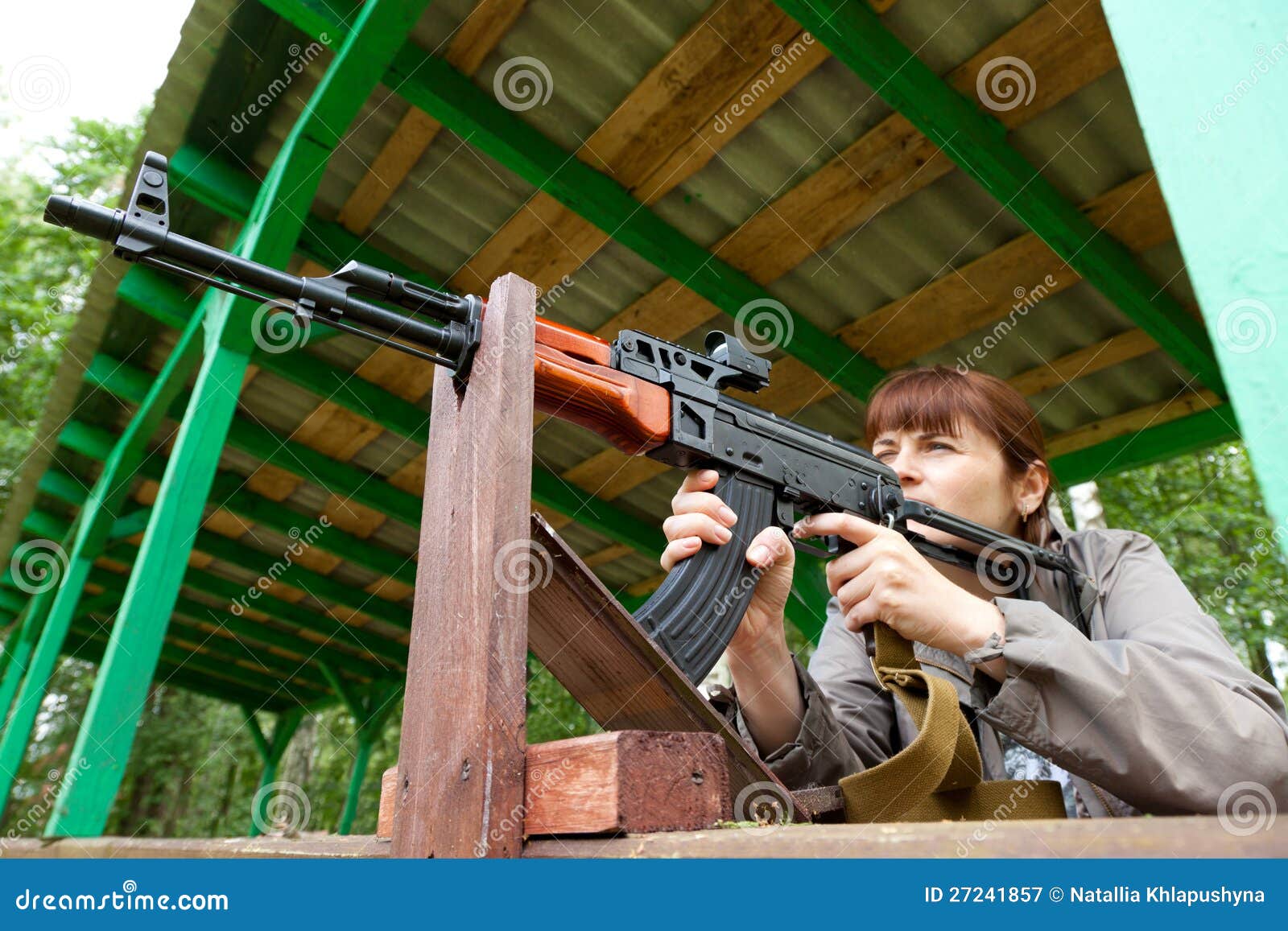 Woman Shooting an Automatic Rifle for Strikeball Stock Image - Image of ...