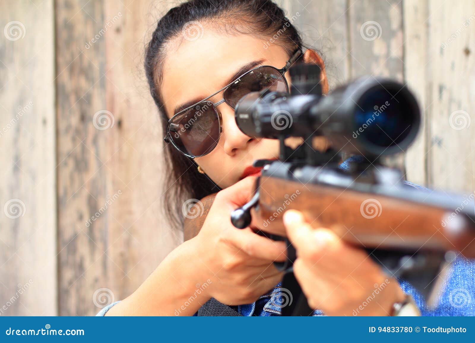 Woman at the Shooting Range Shot from a Rifle. Stock Photo - Image of ...