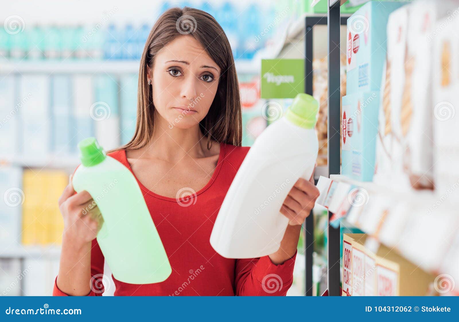 Woman comparing products stock photo. Image of hypermarket - 104312062 Woman comparing products stock photo. Image of hypermarket - 104312062