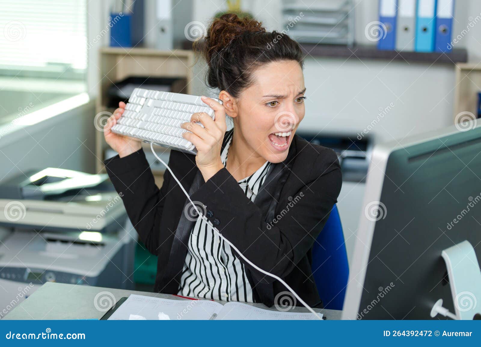 Woman Shouting at Computer Poised To Attack it with Keyboard Stock ...