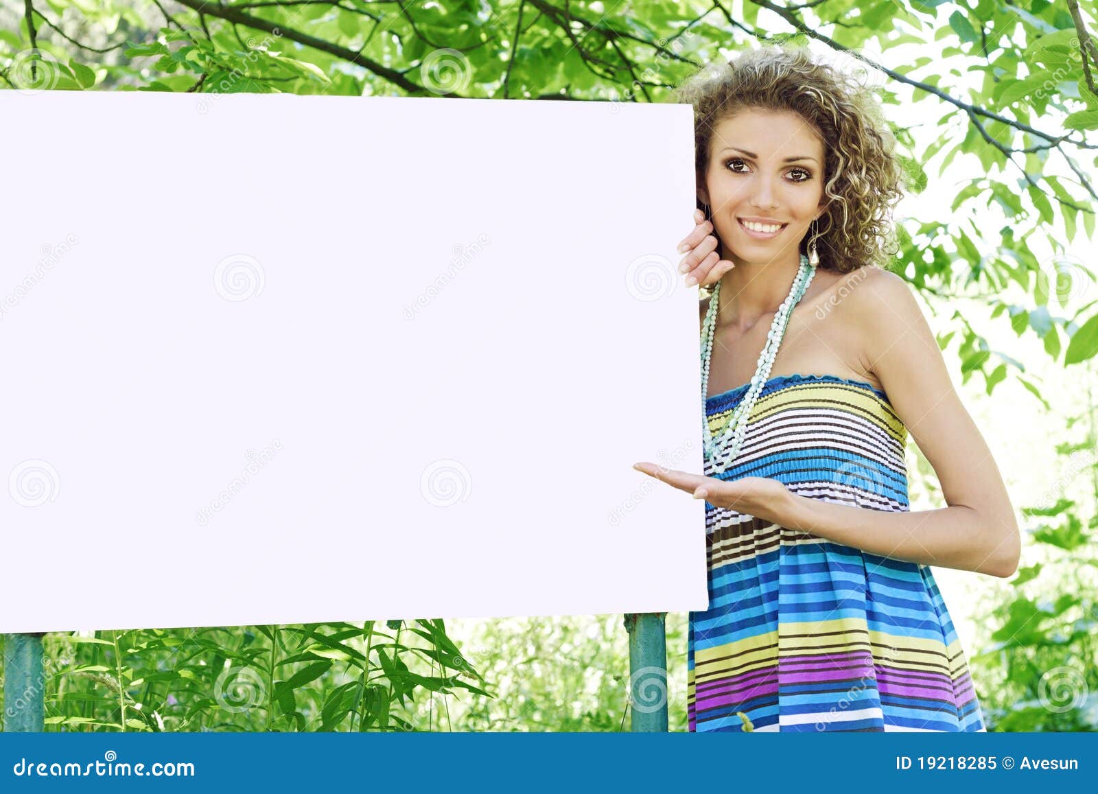 Woman showing billboard stock image. Image of girl, person - 19218285