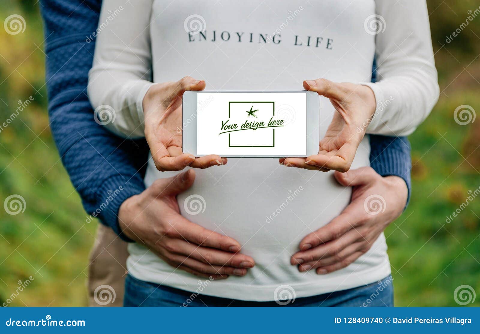 Woman Showing Customizable Screen of Mobile with Her Partner Stock ... Woman Showing Customizable Screen of Mobile with Her Partner Stock ...