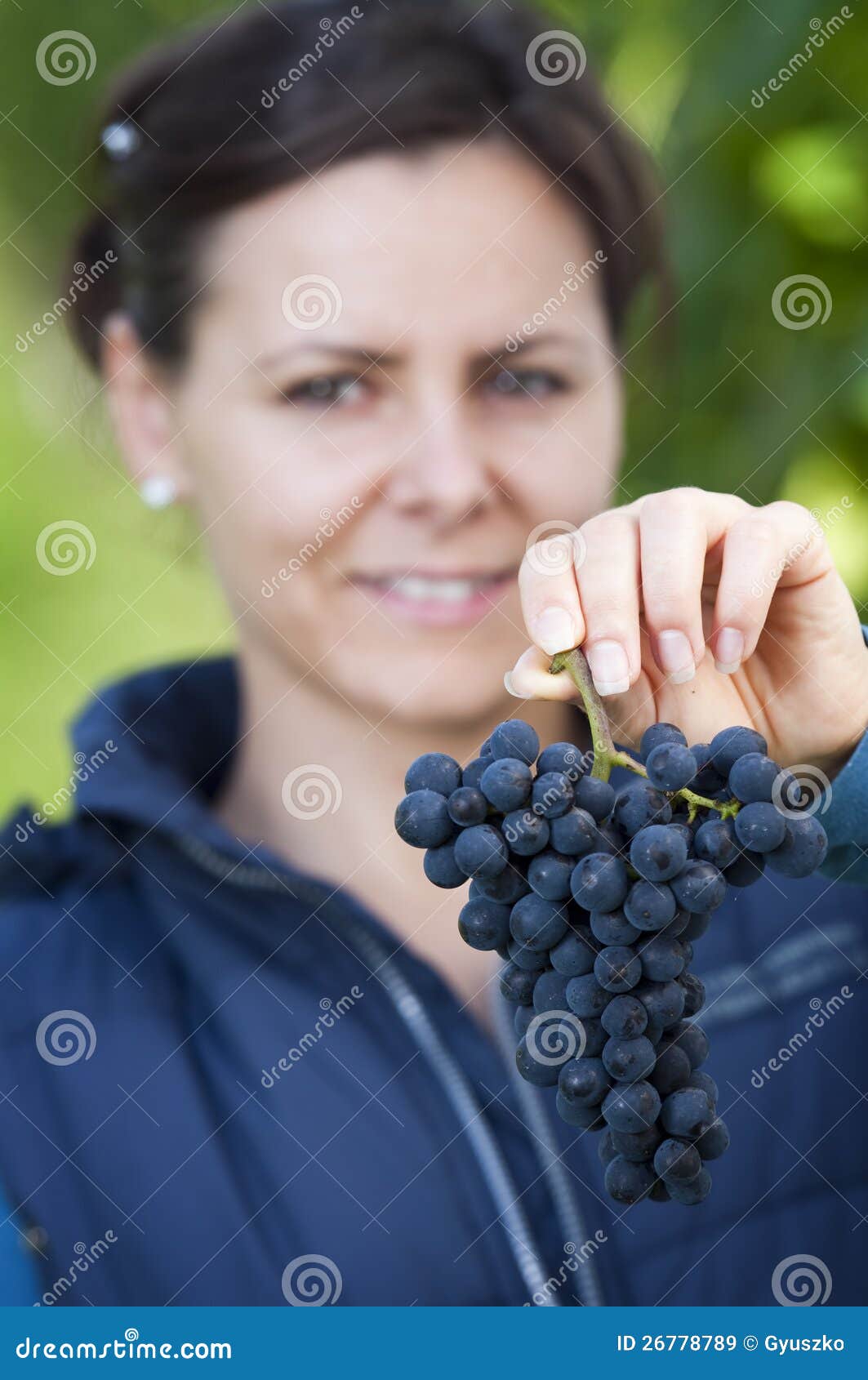 Woman showing red grape stock image. Image of grower - 26778789