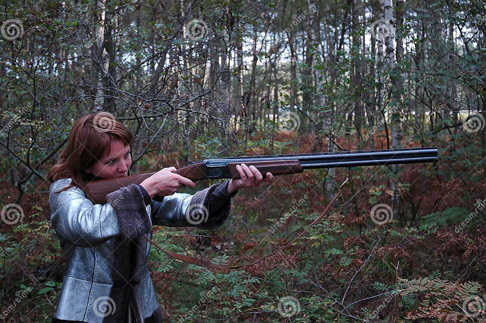 Woman is shuting stock image. Image of beauty, armed - 11330235