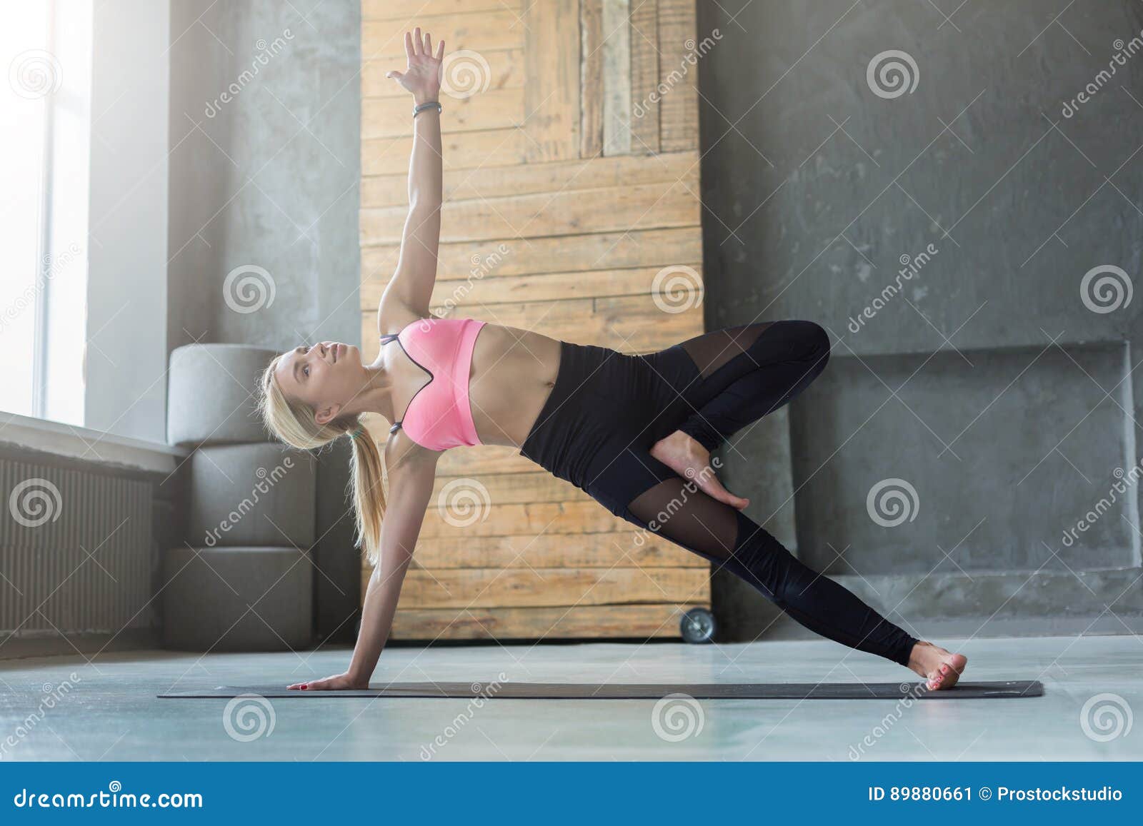 Woman In Side Plank Pose At Yoga Class Stock Image Image Of
