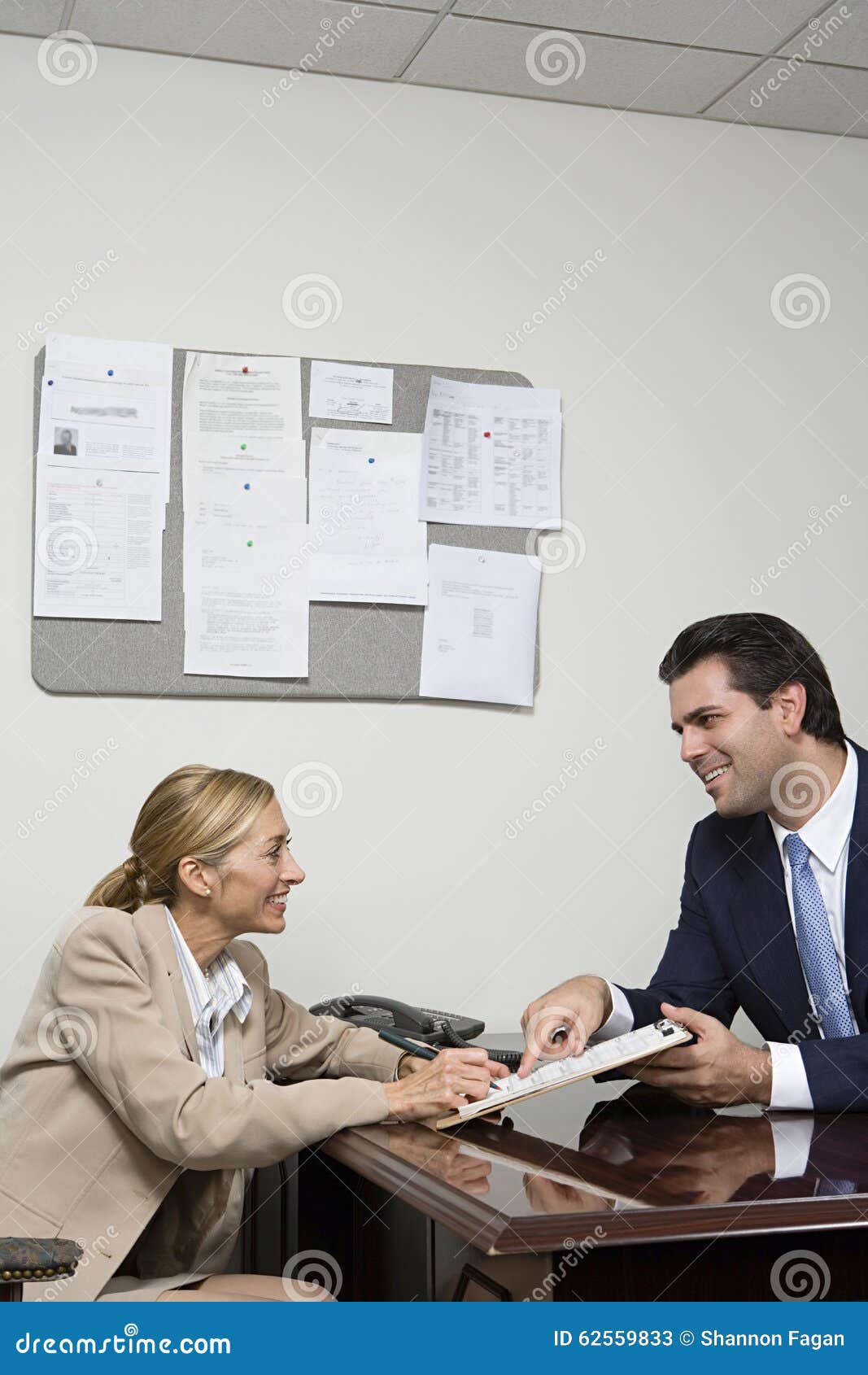 Woman signing contract stock image. Image of interior - 62559833