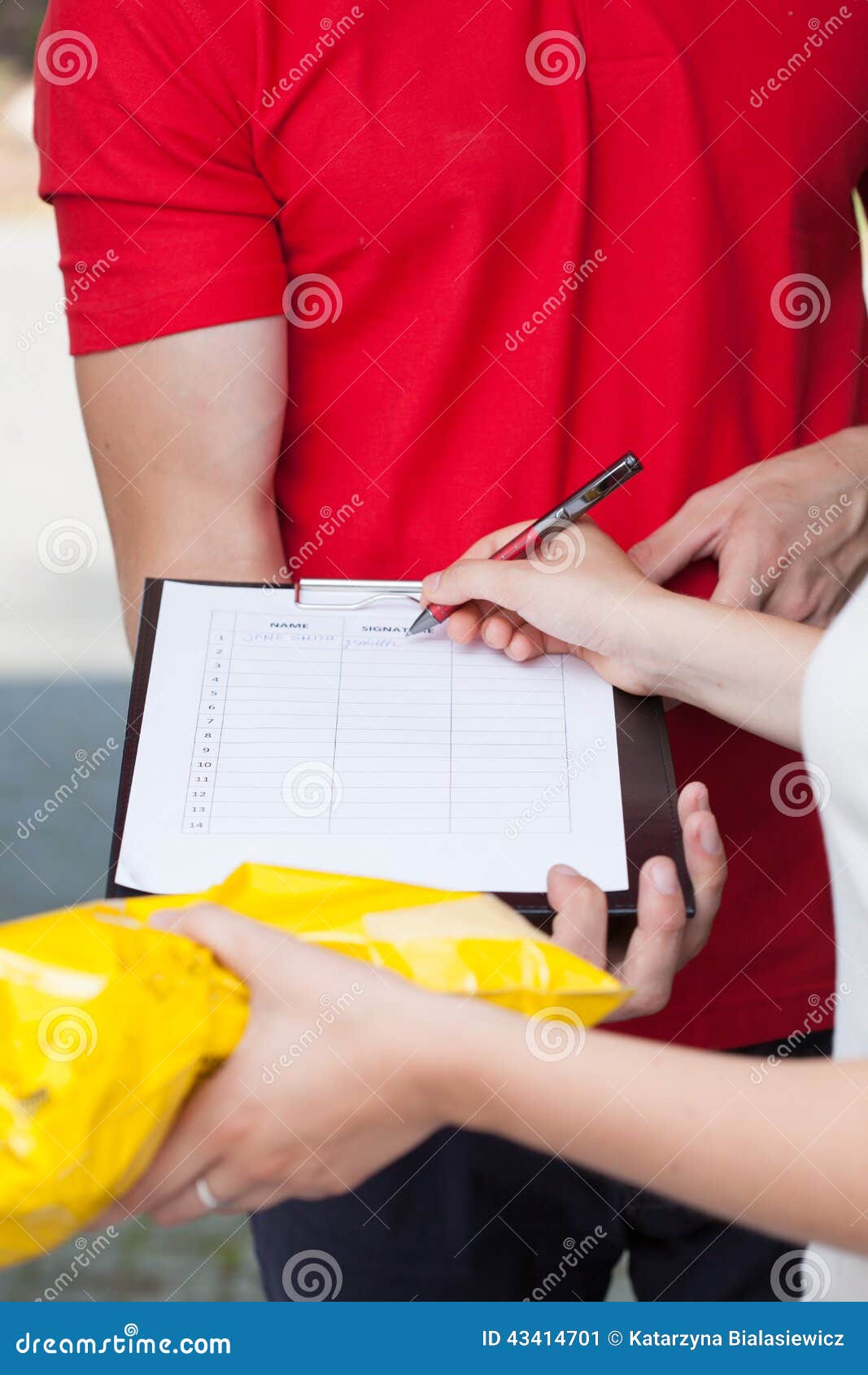 Woman Signing Document of Delivered Package Stock Image - Image of ...