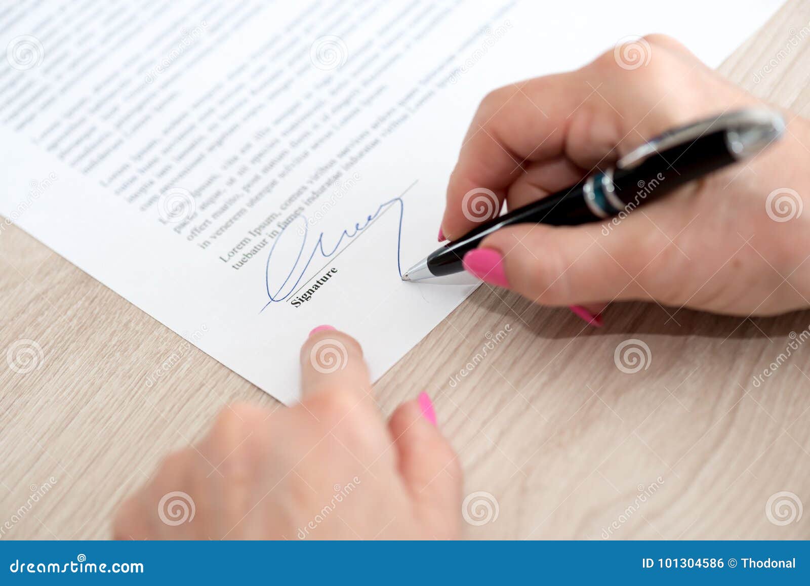 Woman signing a contract stock photo. Image of deal - 101304586