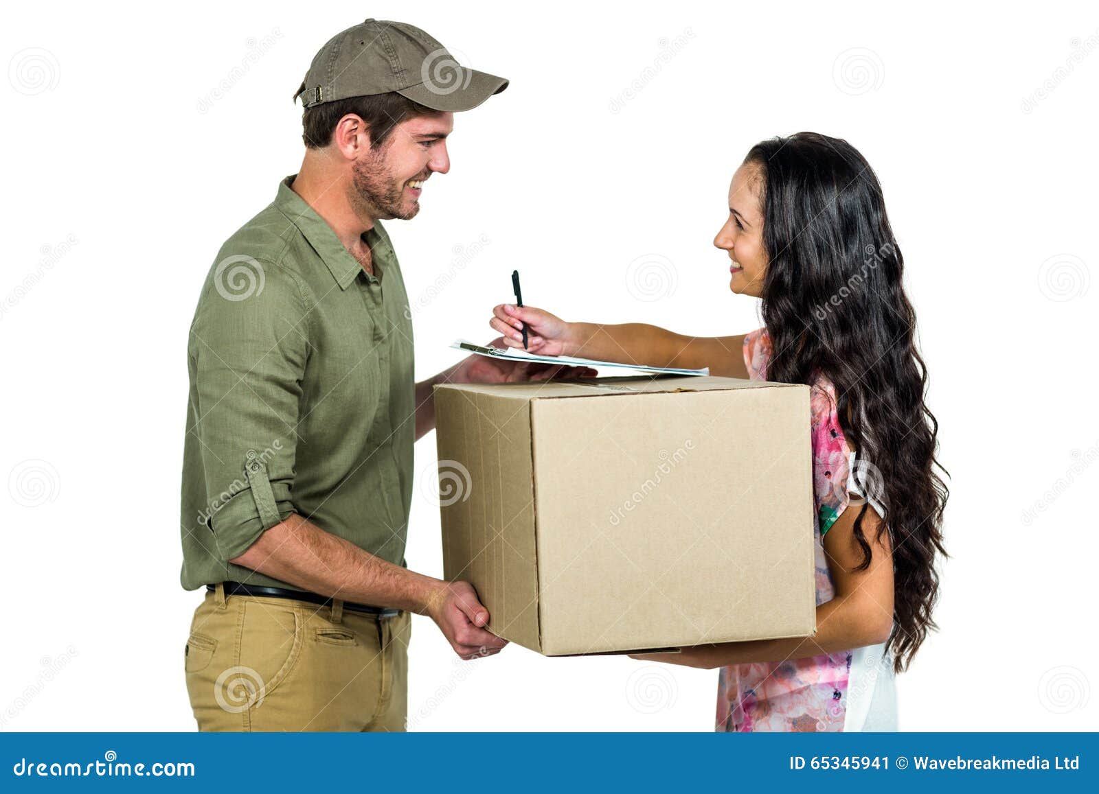 Woman Signing for Pack Delivery with Smiling Postman Stock Image ...