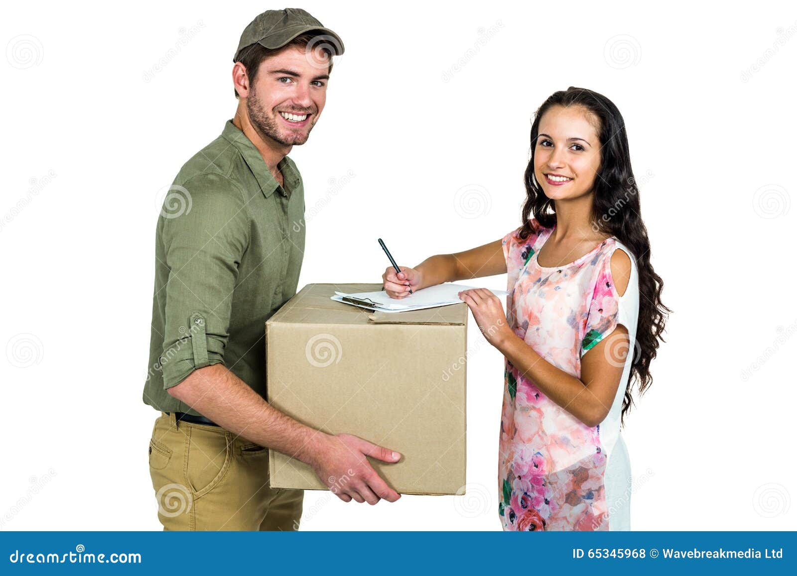 Woman Signing for Pack Delivery with Smiling Postman Stock Photo ...