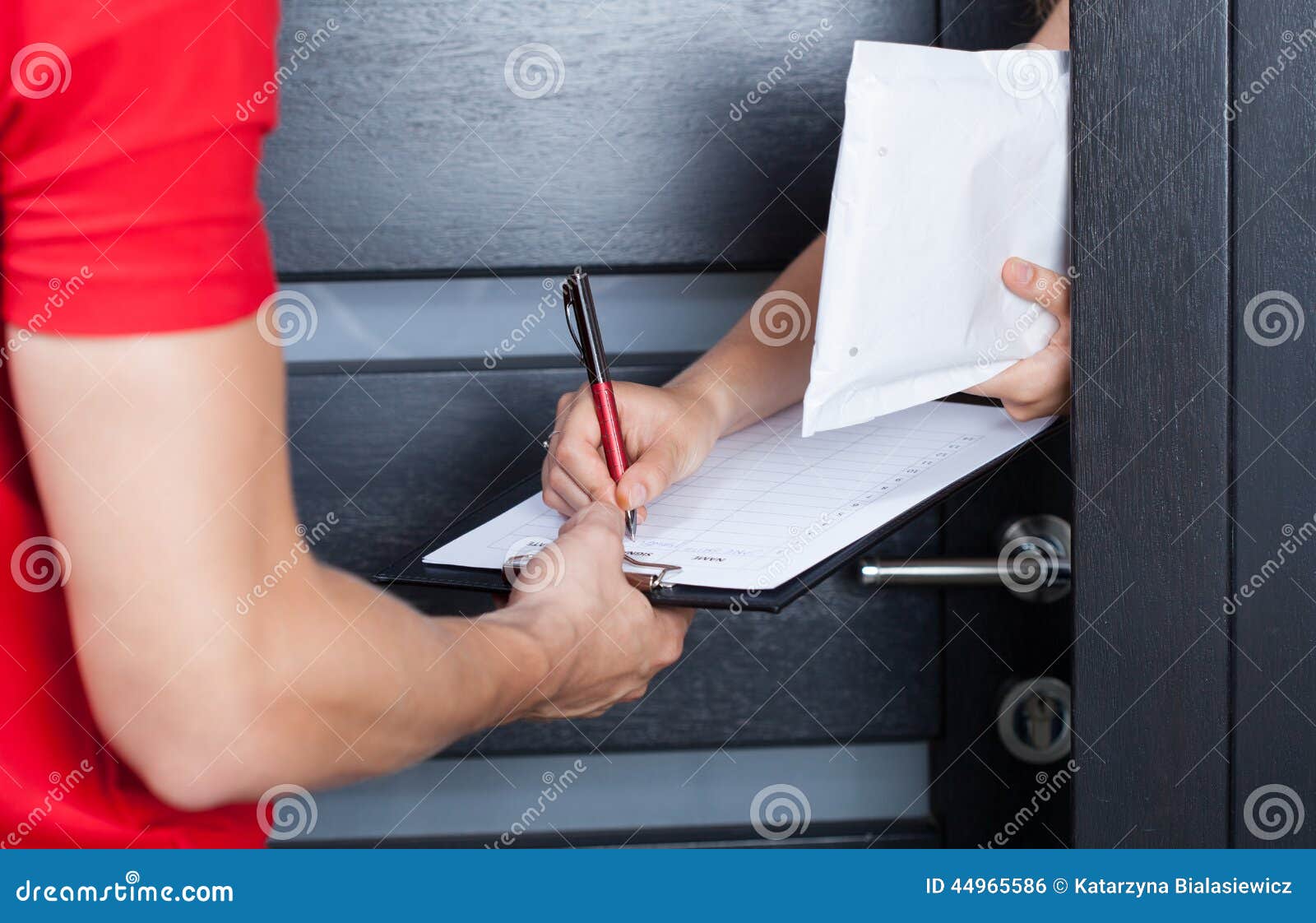 Woman Signing Package Delivery Papers Stock Photo - Image of documents ...