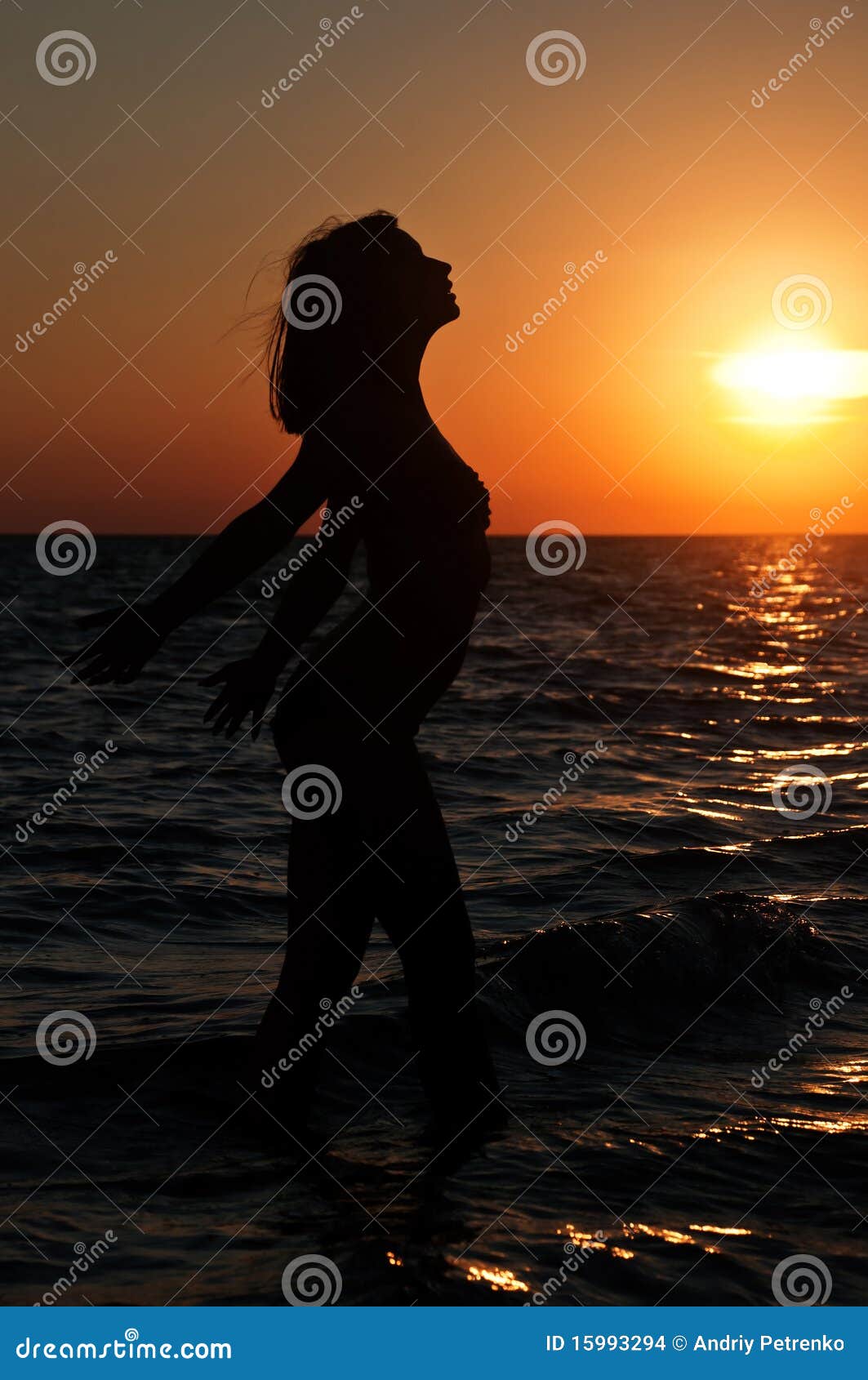 Woman Silhouette Against Sunset Stock Photo - Image of colorful, cloud ...