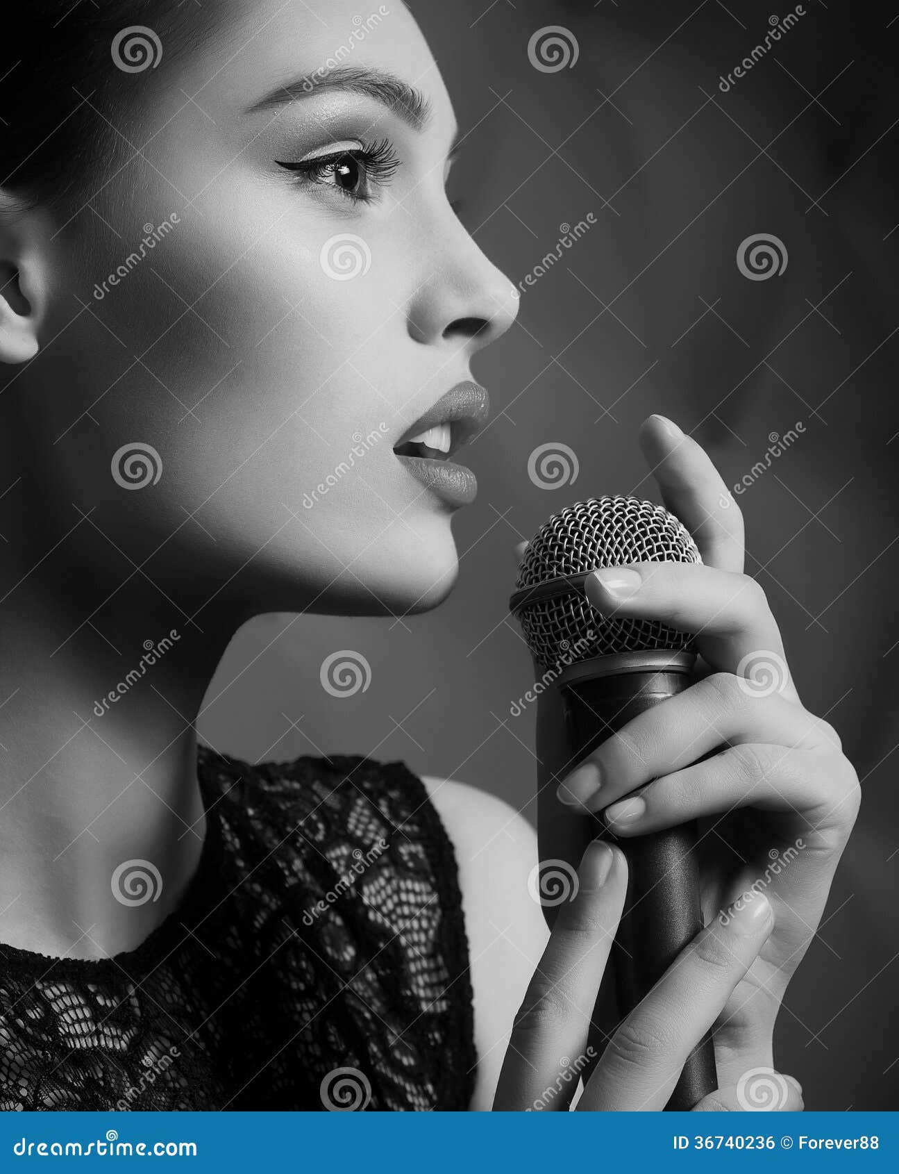 Woman Singer with Microphone Stock Photo - Image of elegant, holding ...