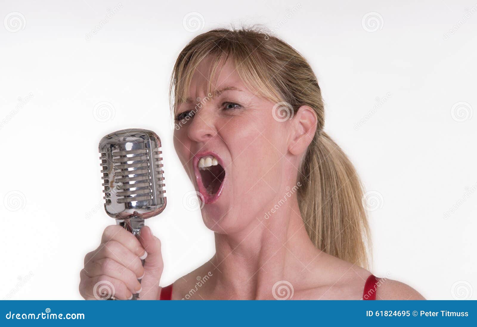 Woman Singing with a Chrome Microphone Stock Image - Image of therapy ...