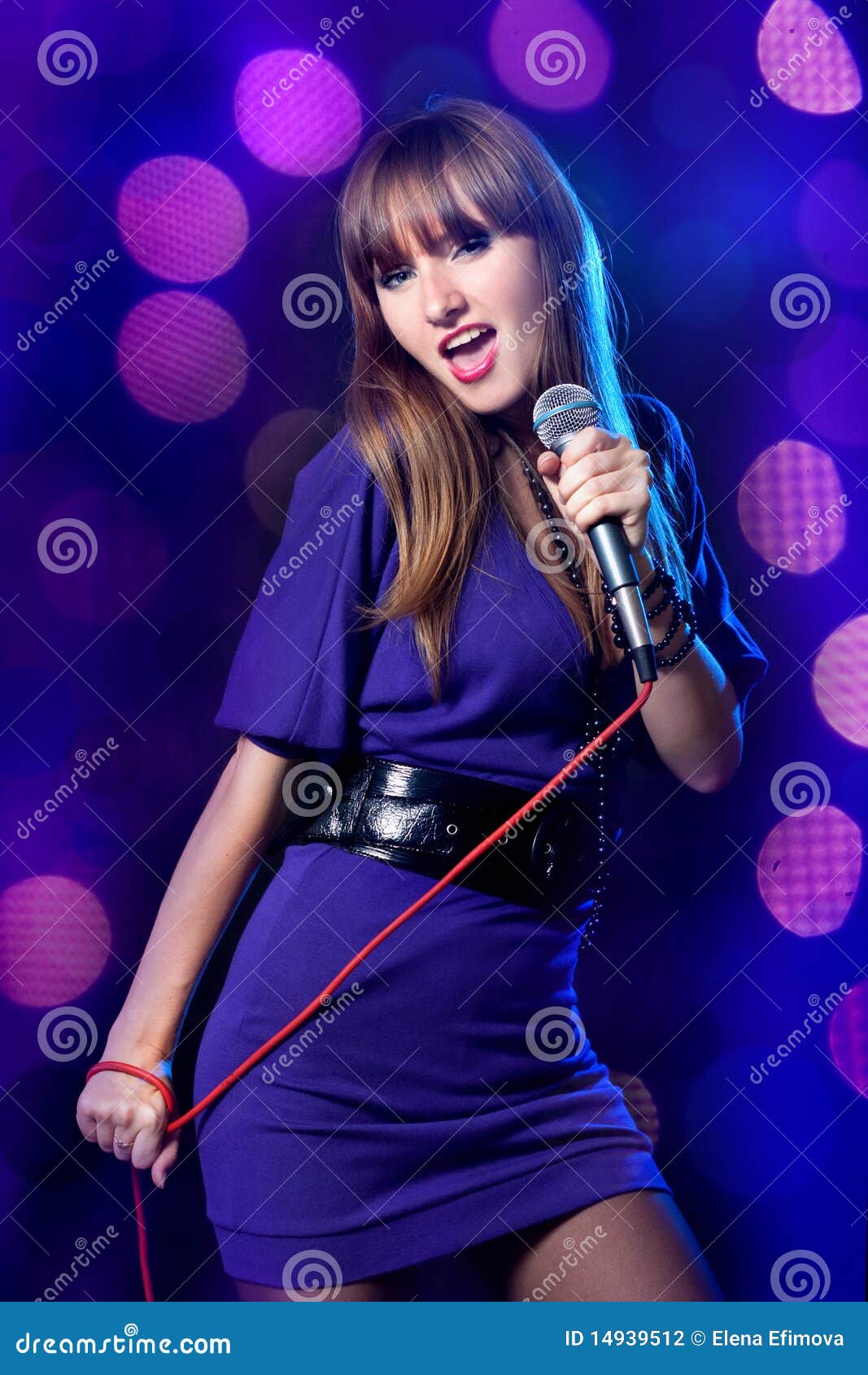 Woman Singing into Microphone Stock Photo - Image of adolescence ...