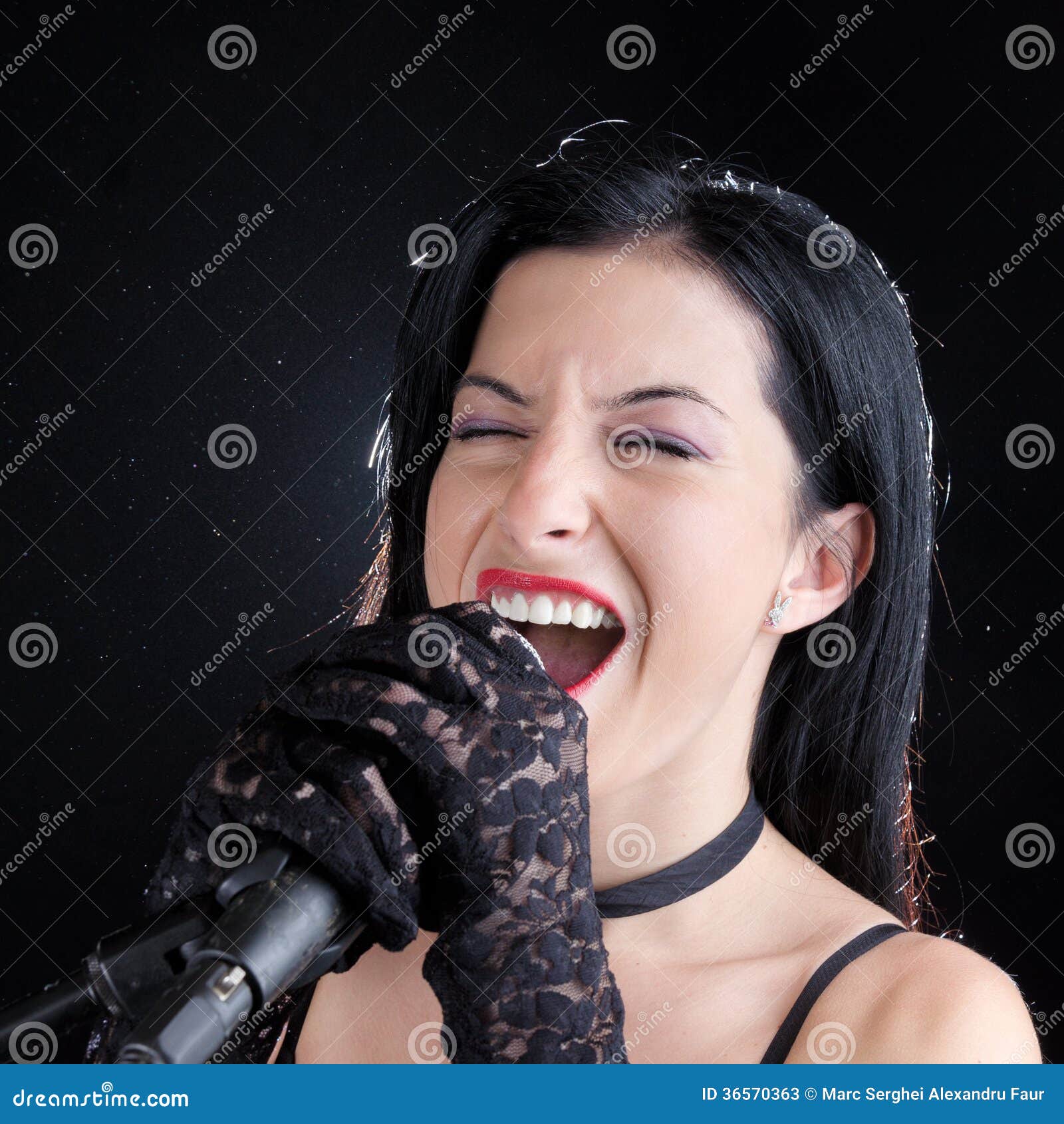Woman Singing with Microphone Stock Image - Image of brunette ...