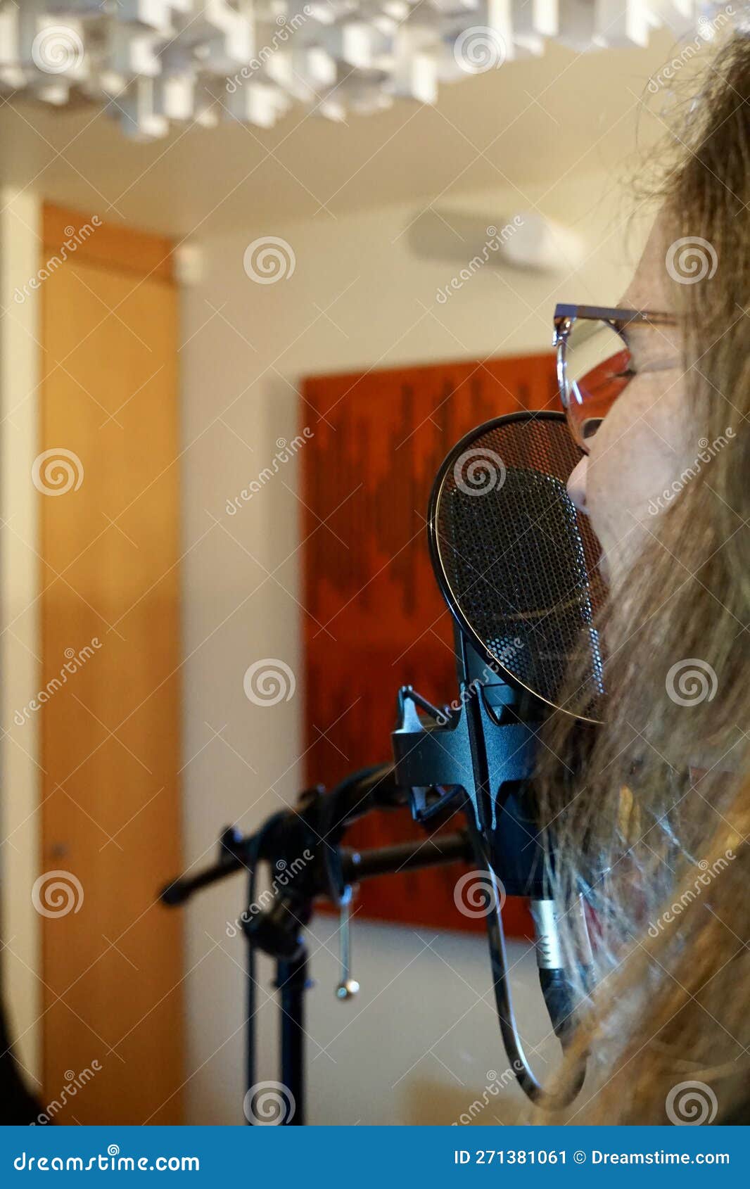 Woman Singing in a Microphone Stock Image - Image of female, hair ...