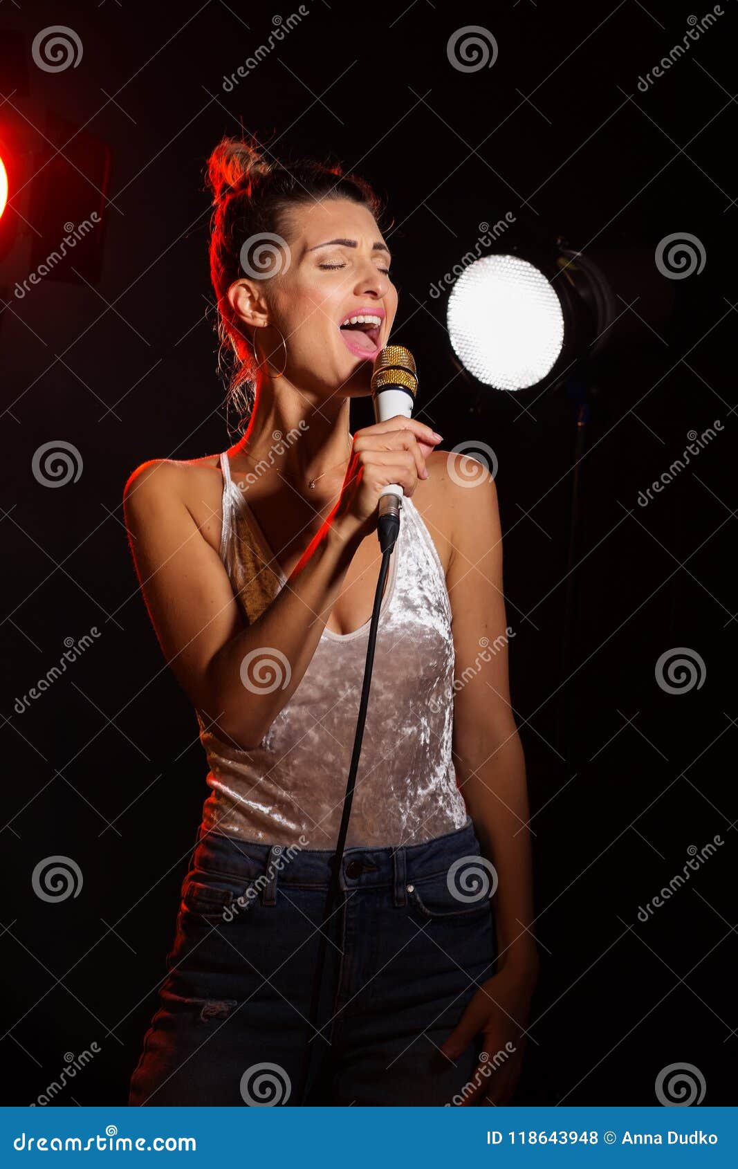 A Woman Sings a Song in the Studio Stock Photo - Image of melody ...