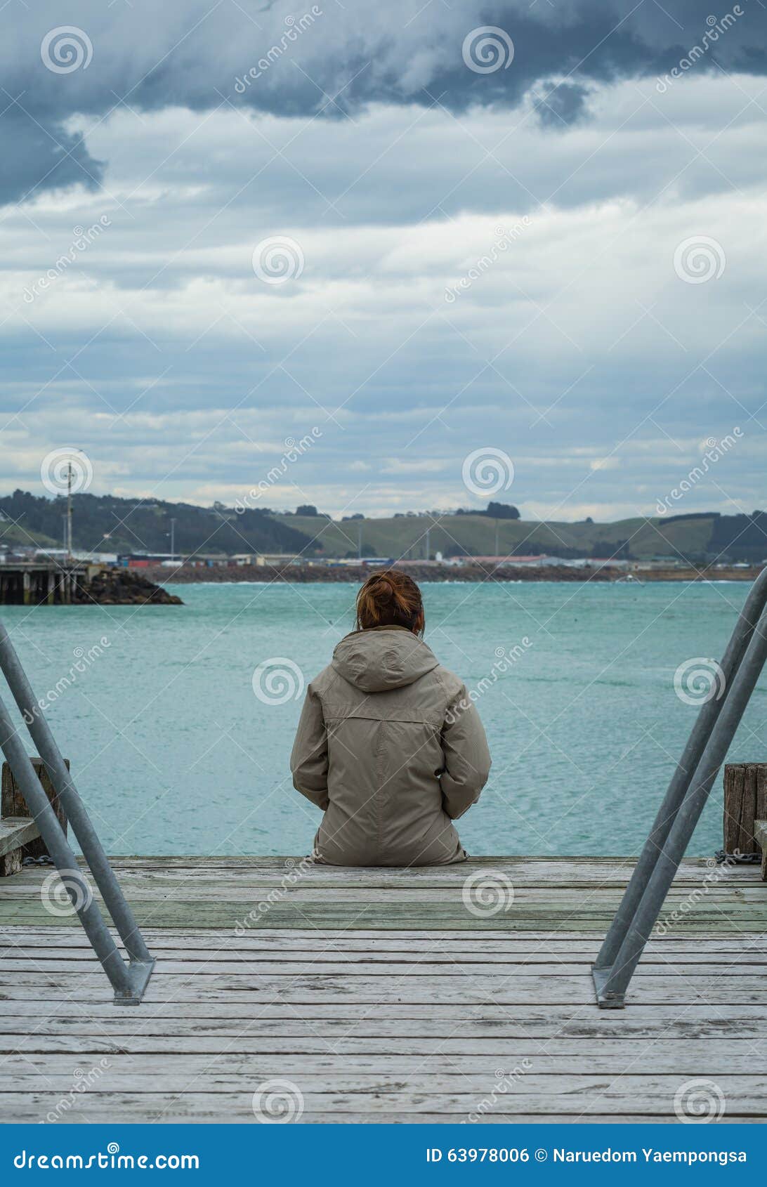 Woman Sit at the Edge of the Bridge Stock Photo - Image of beach, pier ...