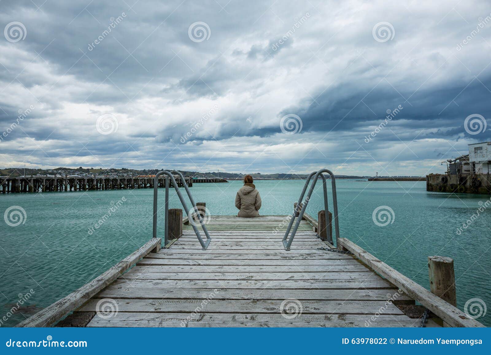 Woman Sit at the Edge of the Bridge Stock Photo - Image of scenic ...