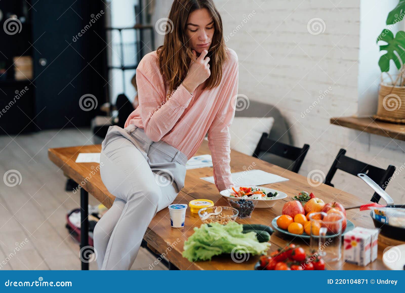 Woman Sits in the Kitchen and Thinks about What To Cook Stock Image ...