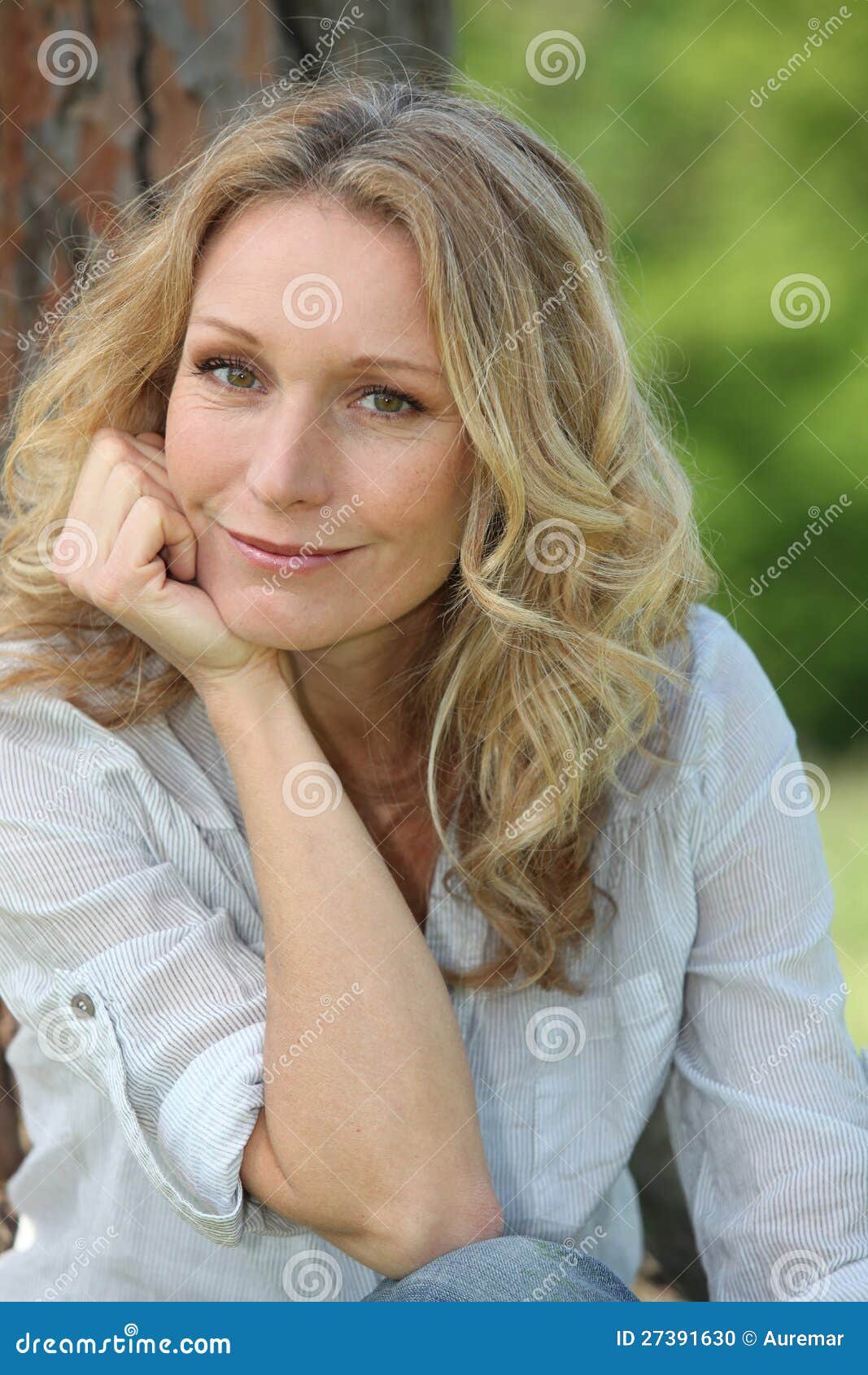 Woman Sitting Against a Tree Stock Photo - Image of nature, countryside ...