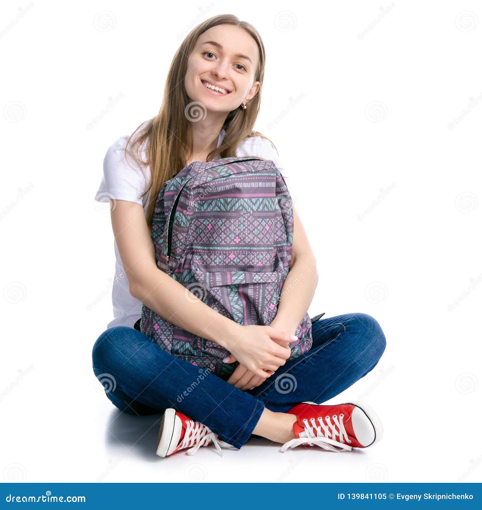 Woman Sitting with Backpack Stock Image - Image of black, beauty: 139841105