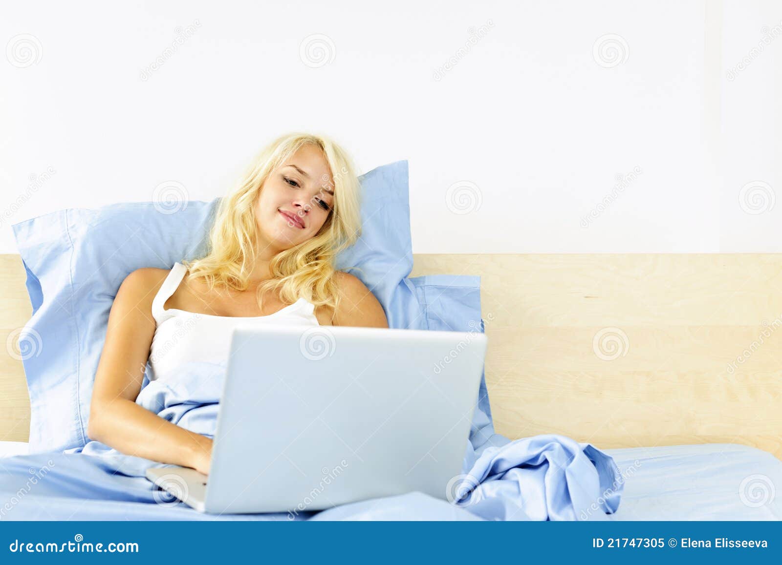 Woman Sitting in Bed with Computer Stock Image - Image of computer ...