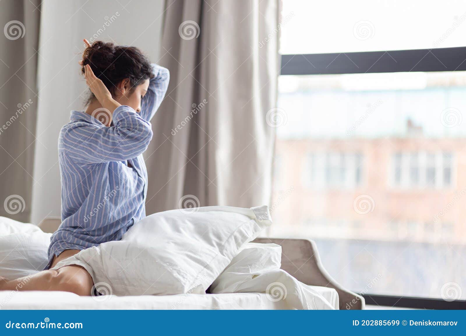 Woman Sitting In Bed And Looking To The Window Stock Image Image Of