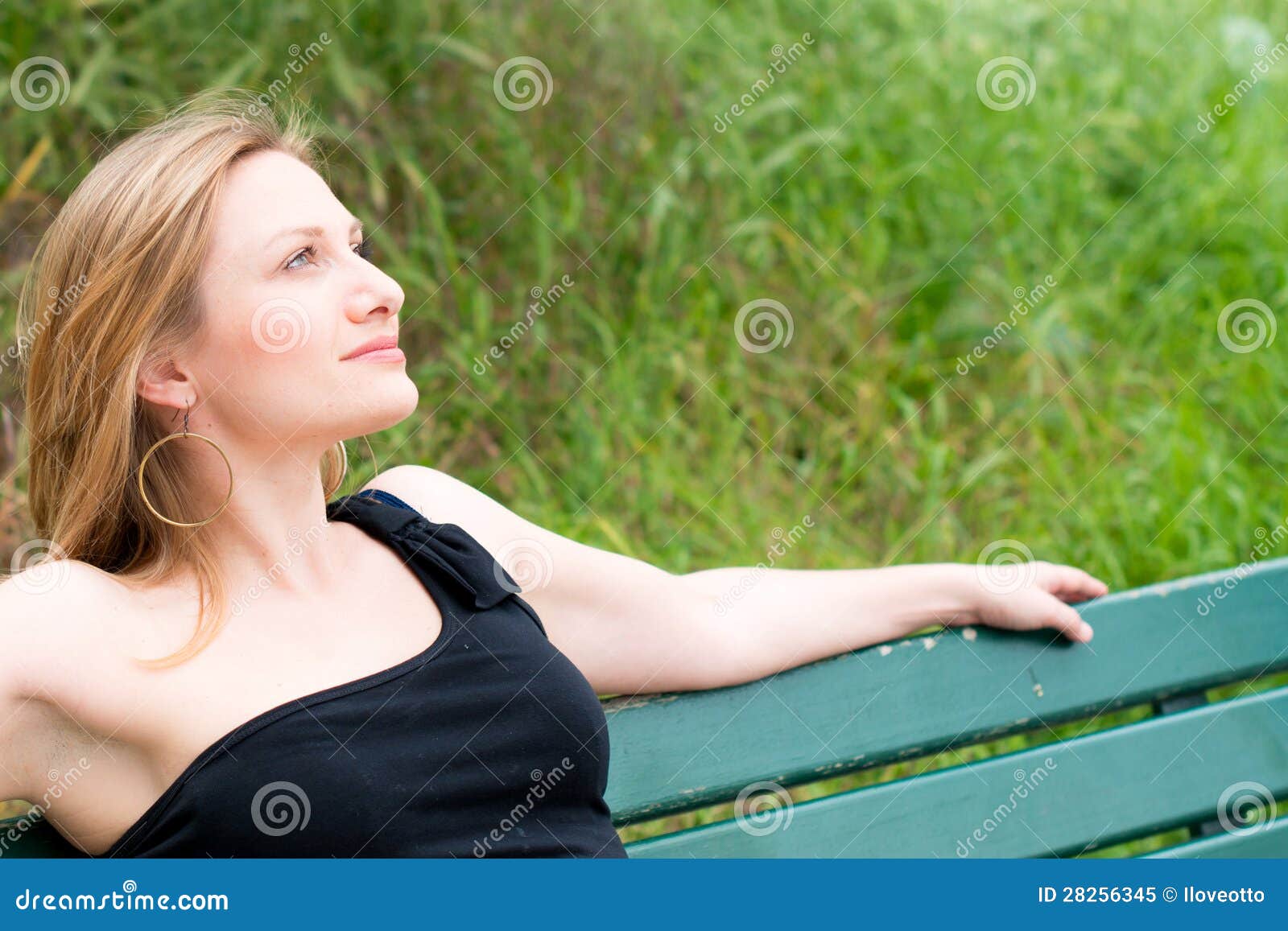 Woman sitting on the bench stock image. Image of casual - 28256345