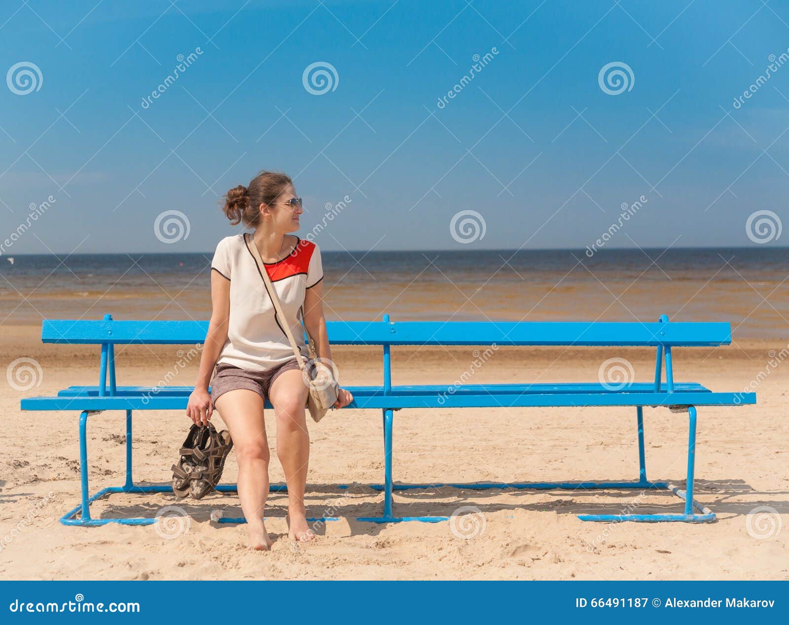 Woman sitting on bench stock image. Image of pretty, landscape - 66491187