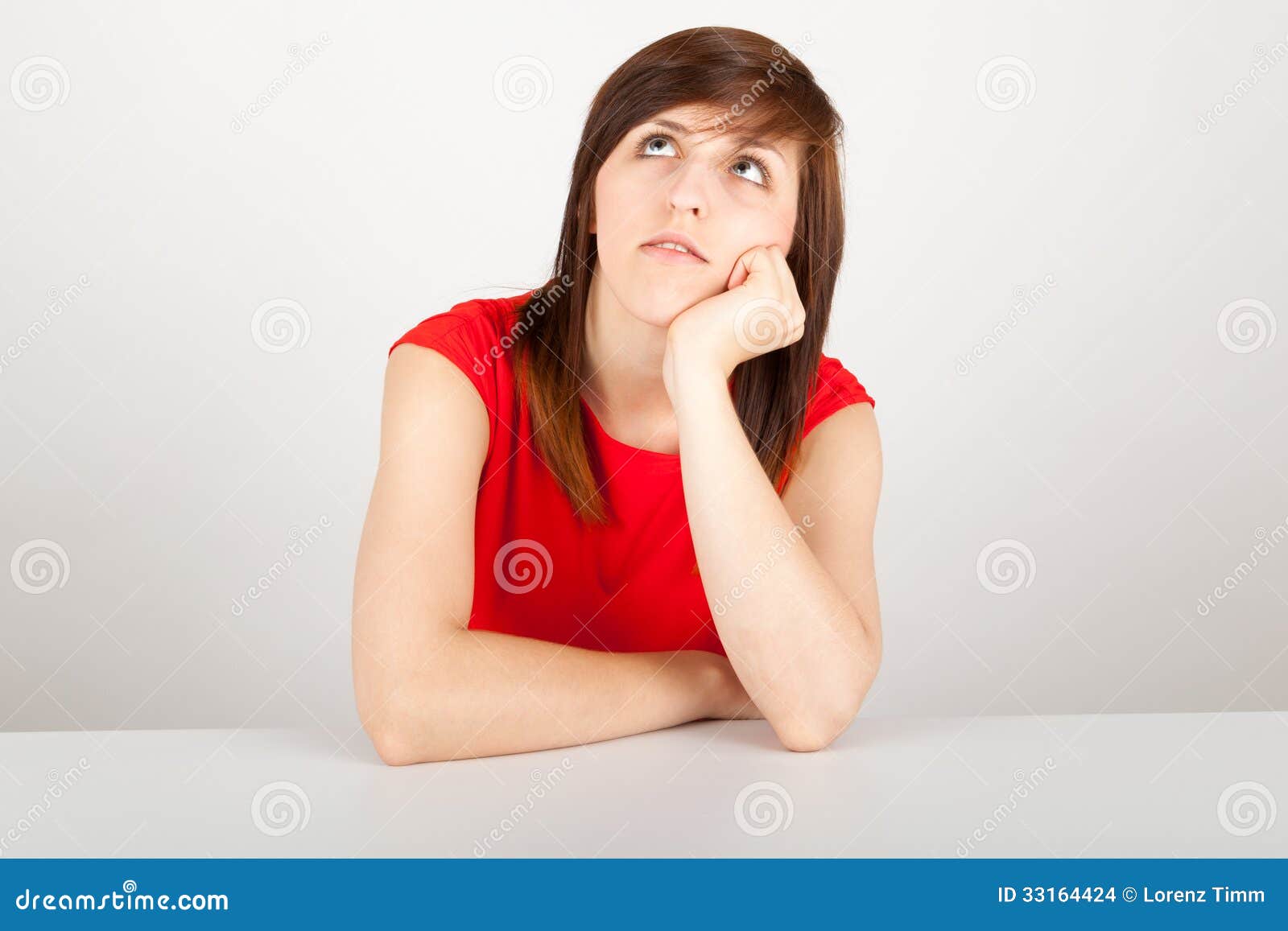 The Woman is Sitting Bored at a Table Stock Photo - Image of table ...