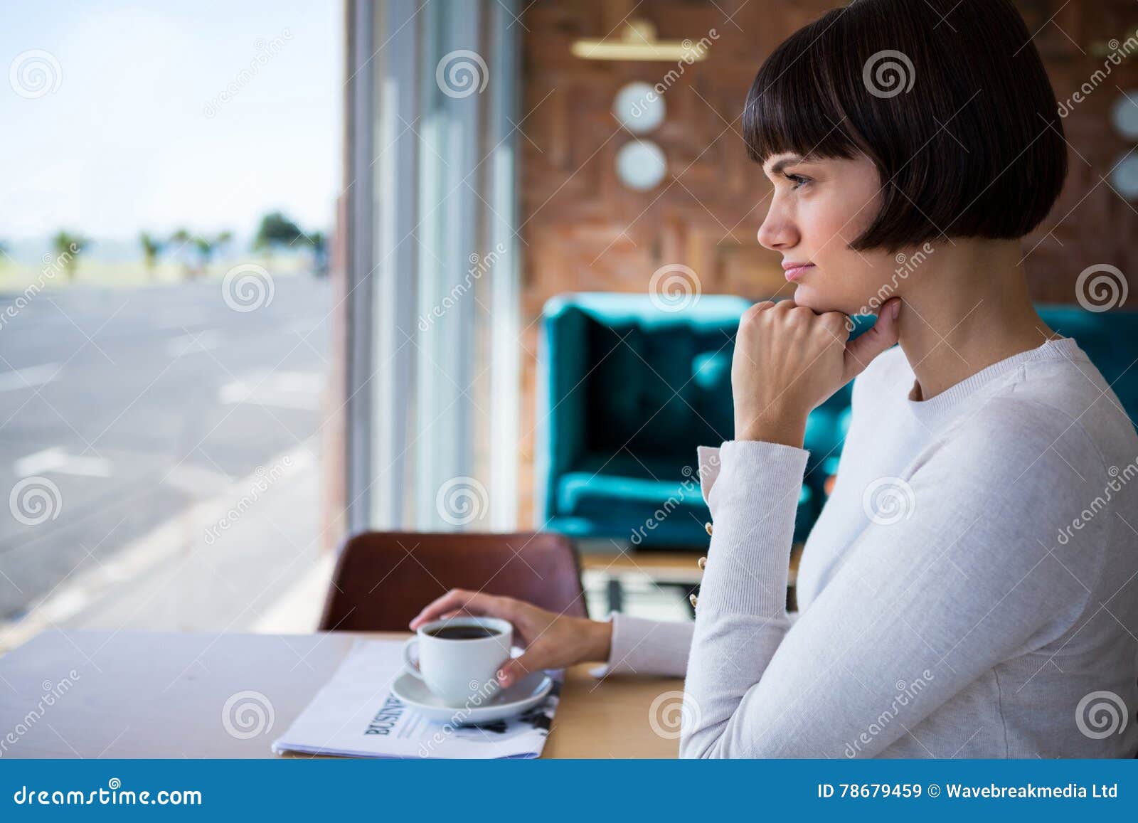 Woman sitting in cafeteria stock image. Image of leisure - 78679459