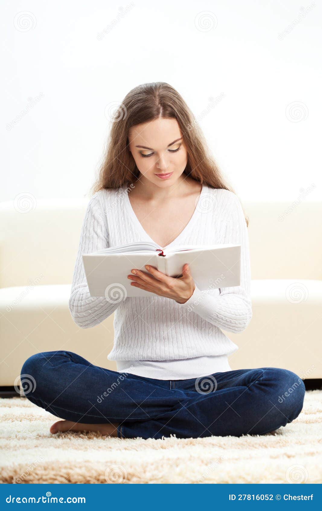 Woman Sitting on Carpet with Book Stock Photo - Image of joyful, female ...