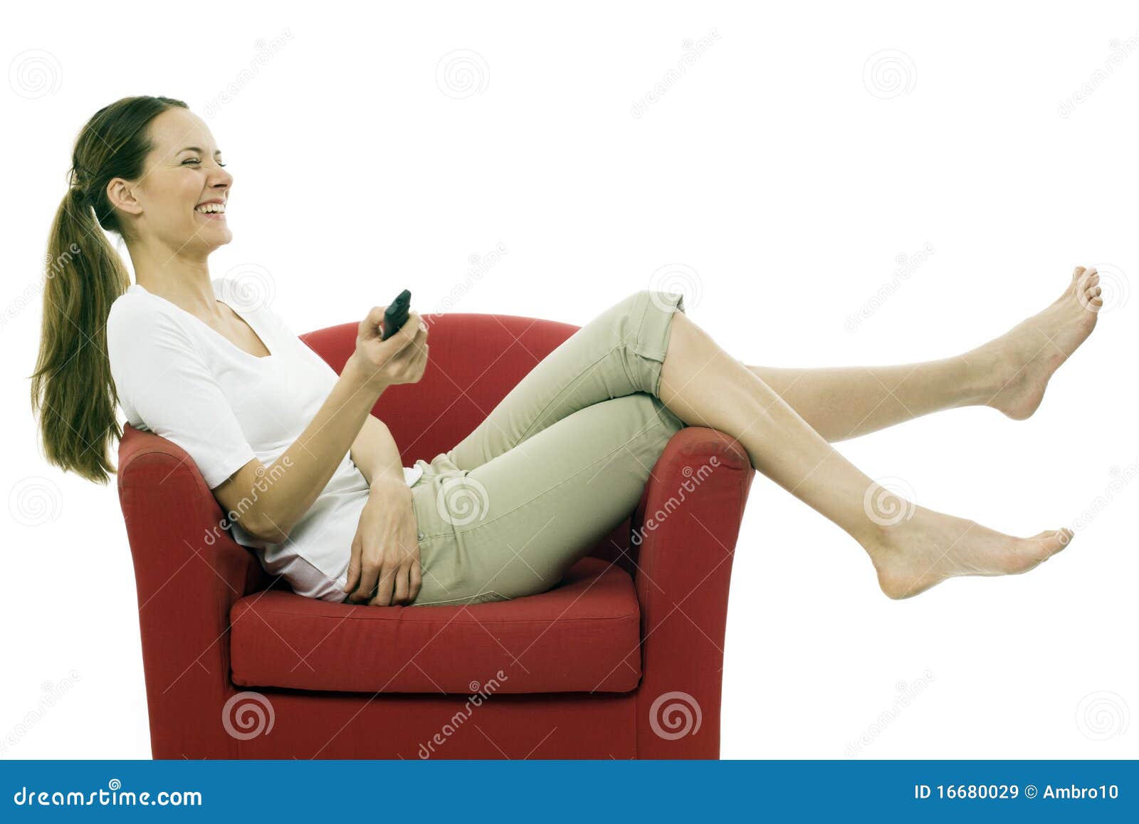 Woman Sitting on a Chair with Remote Control Stock Image - Image of ...