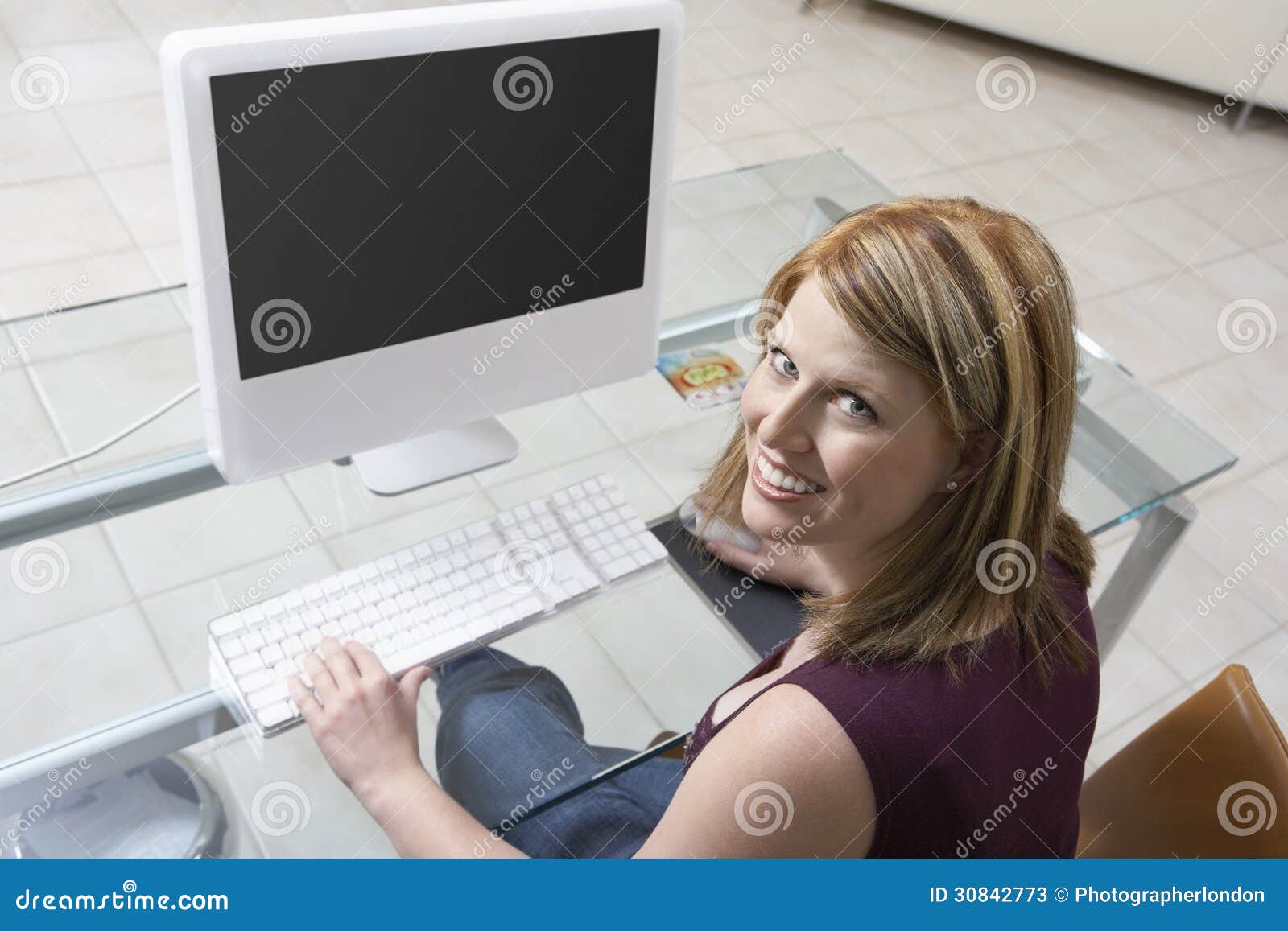 Woman Sitting at Computer stock image. Image of mouse - 30842773