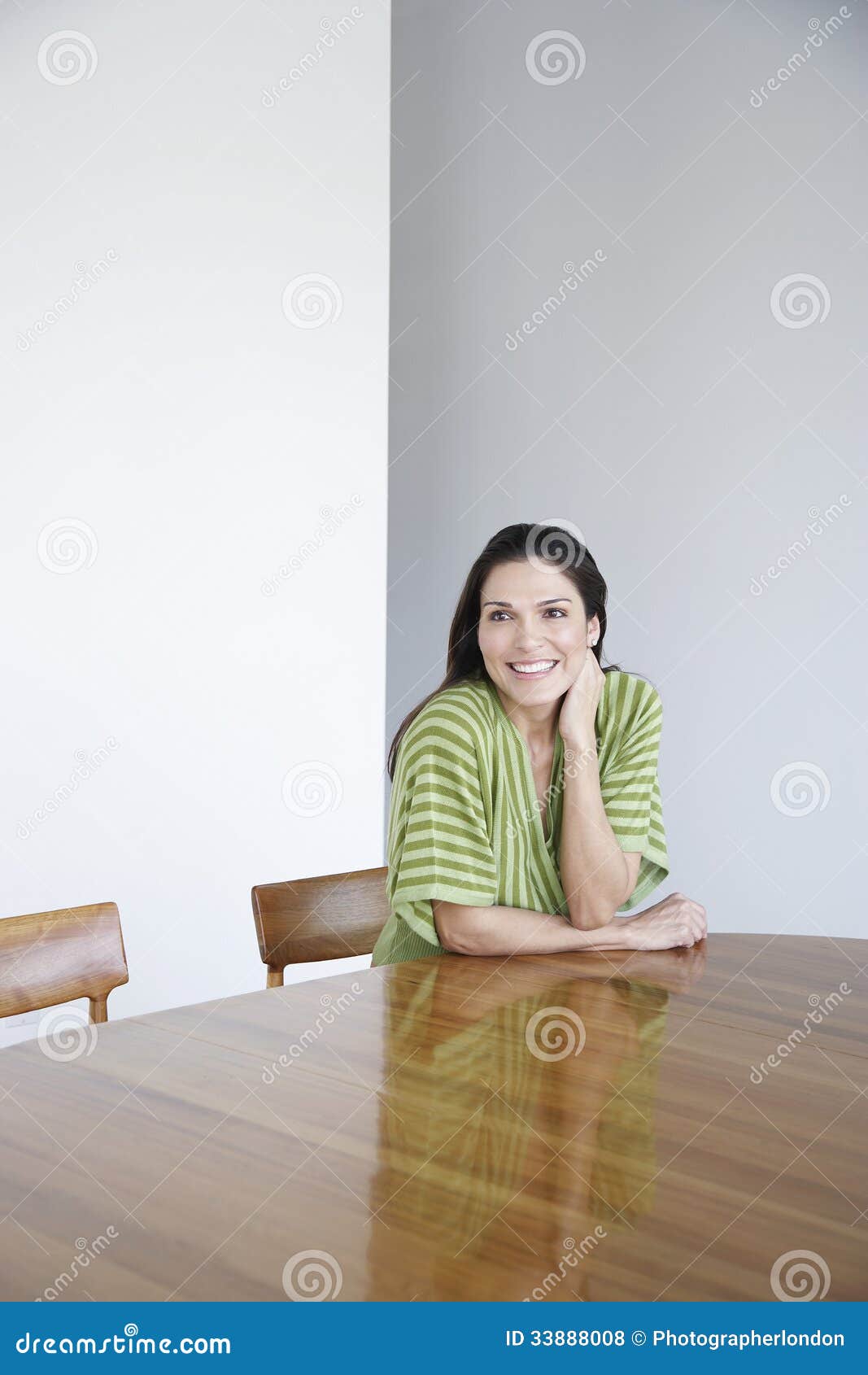 Woman Sitting at Dining Table Stock Photo - Image of simplicity, female ...
