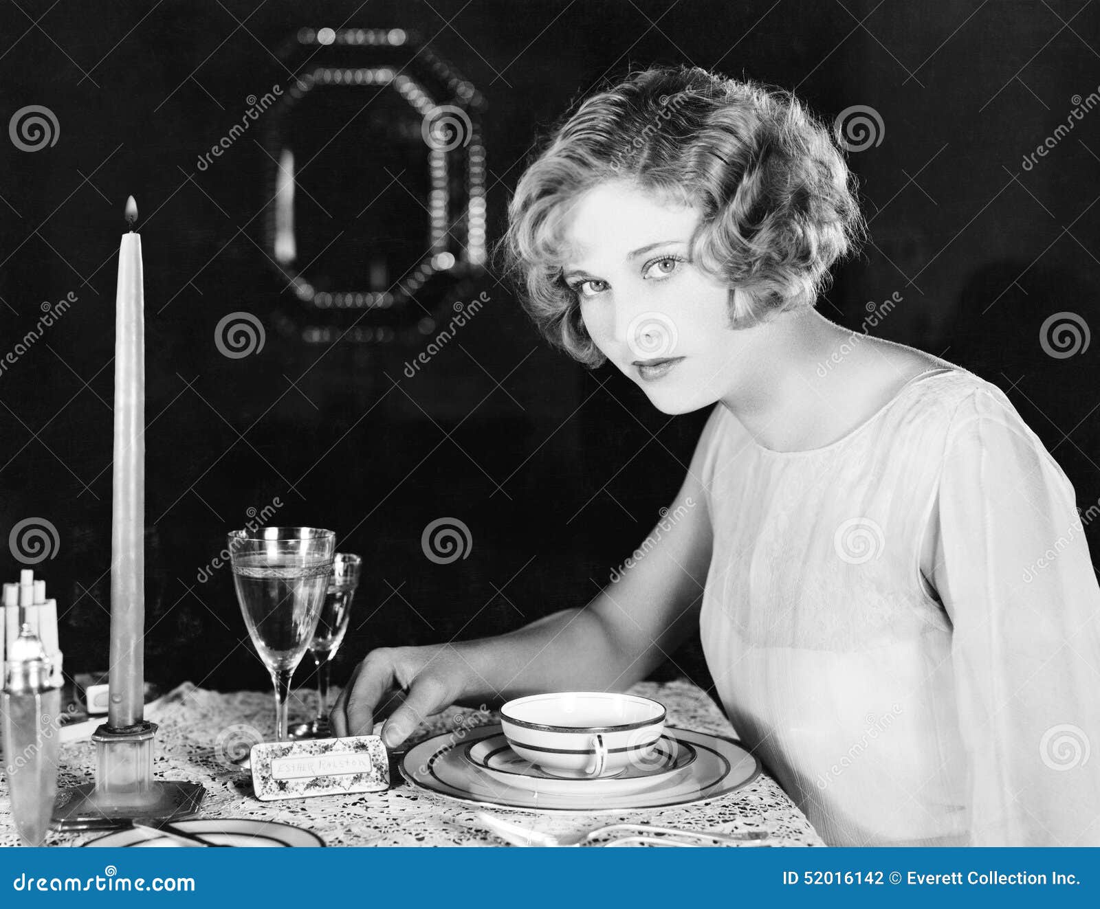 Woman Sitting at the Dinner Table Stock Photo - Image of candles, days ...